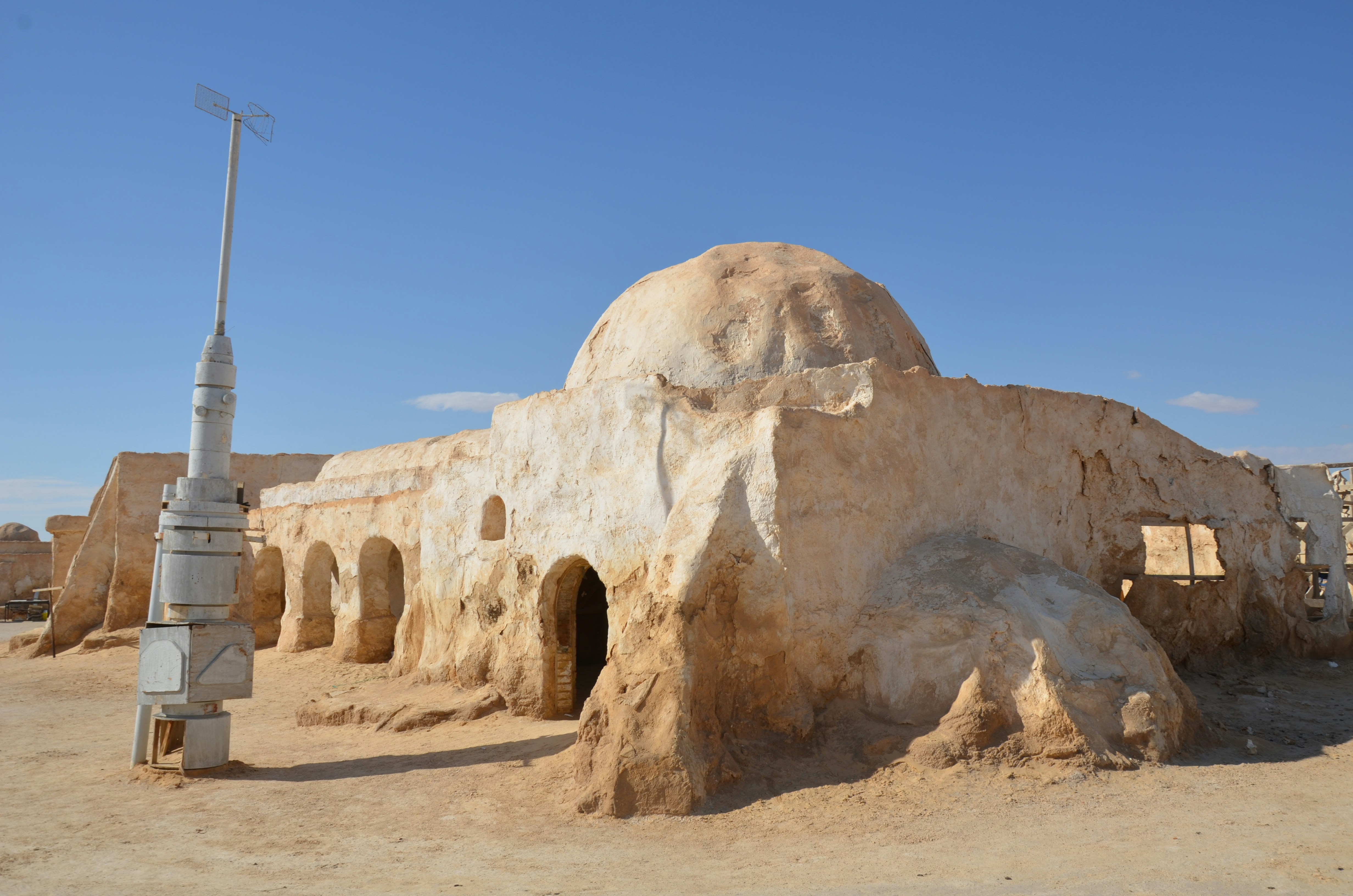 Desert landscape with traditional adobe-style buildings