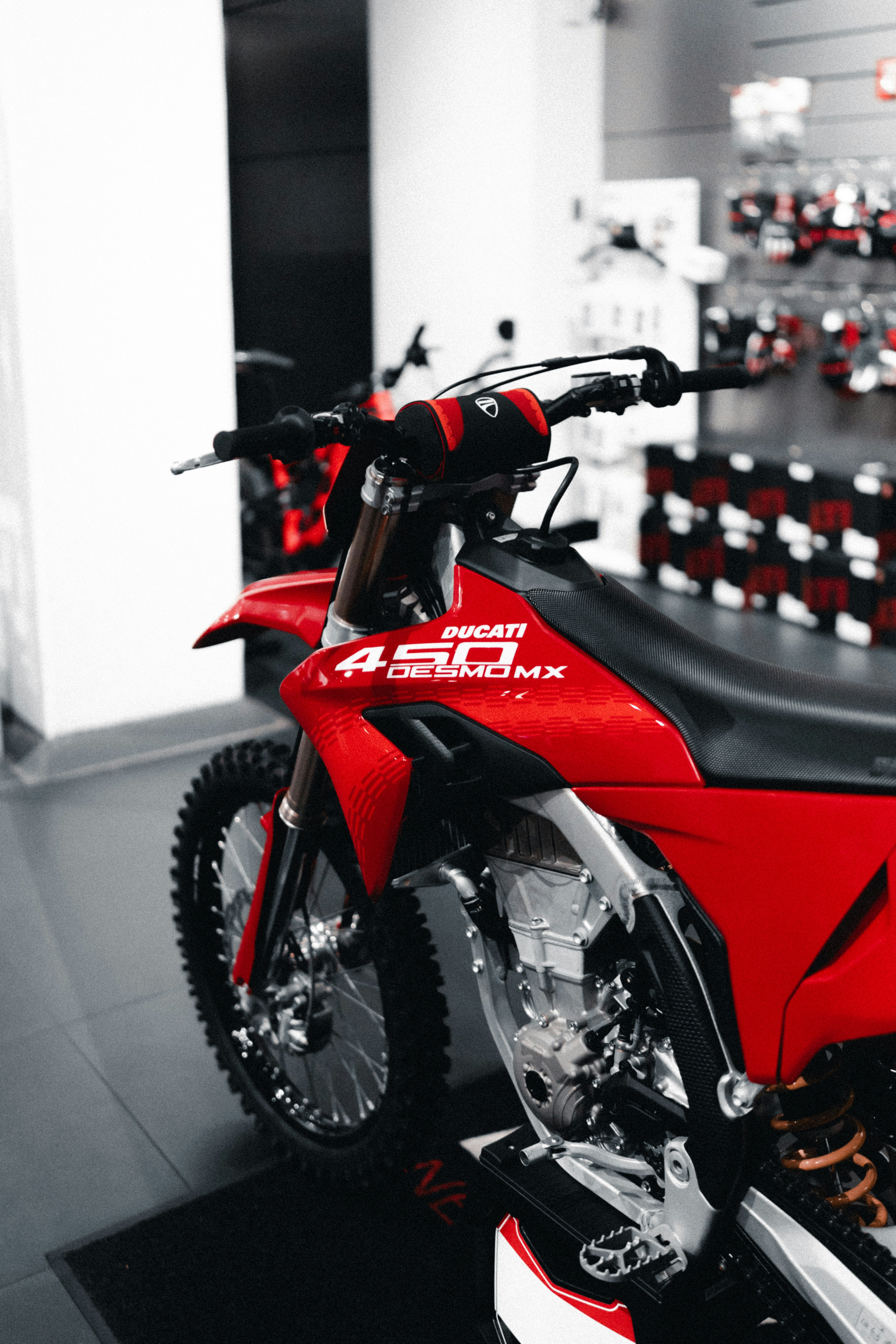 New Ducati Desmo 450 MX | Red ducati dirt bike on display