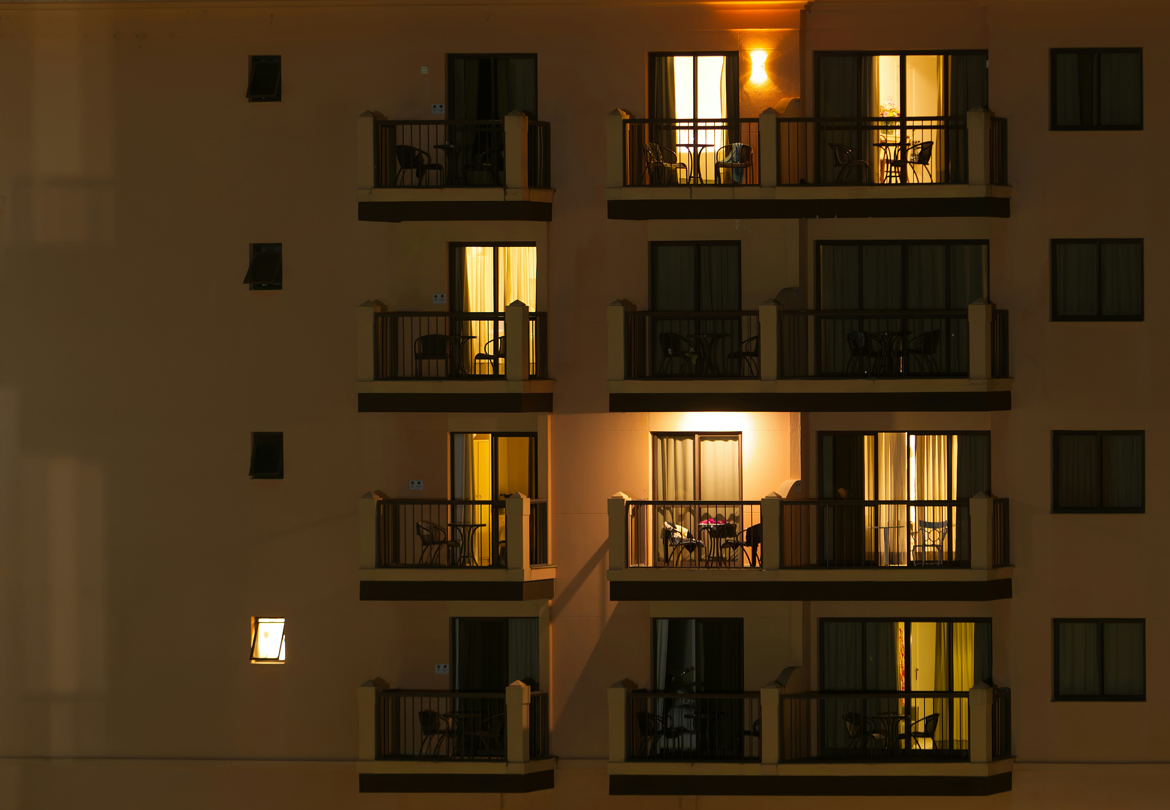 Illuminated Windows: A Glimpse into Urban Life