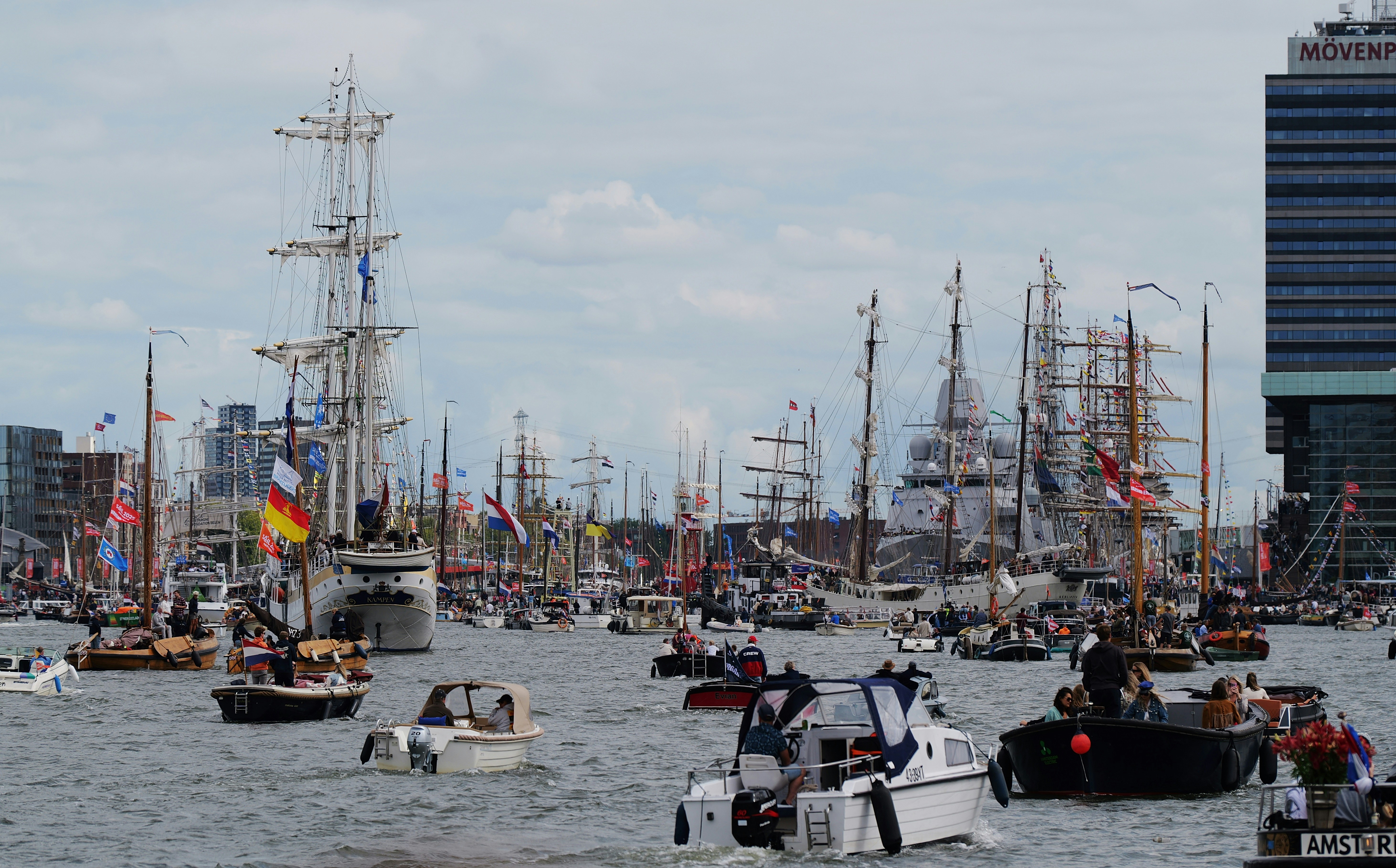 Harbor Parade: A Tangle of Masts and Motorboats