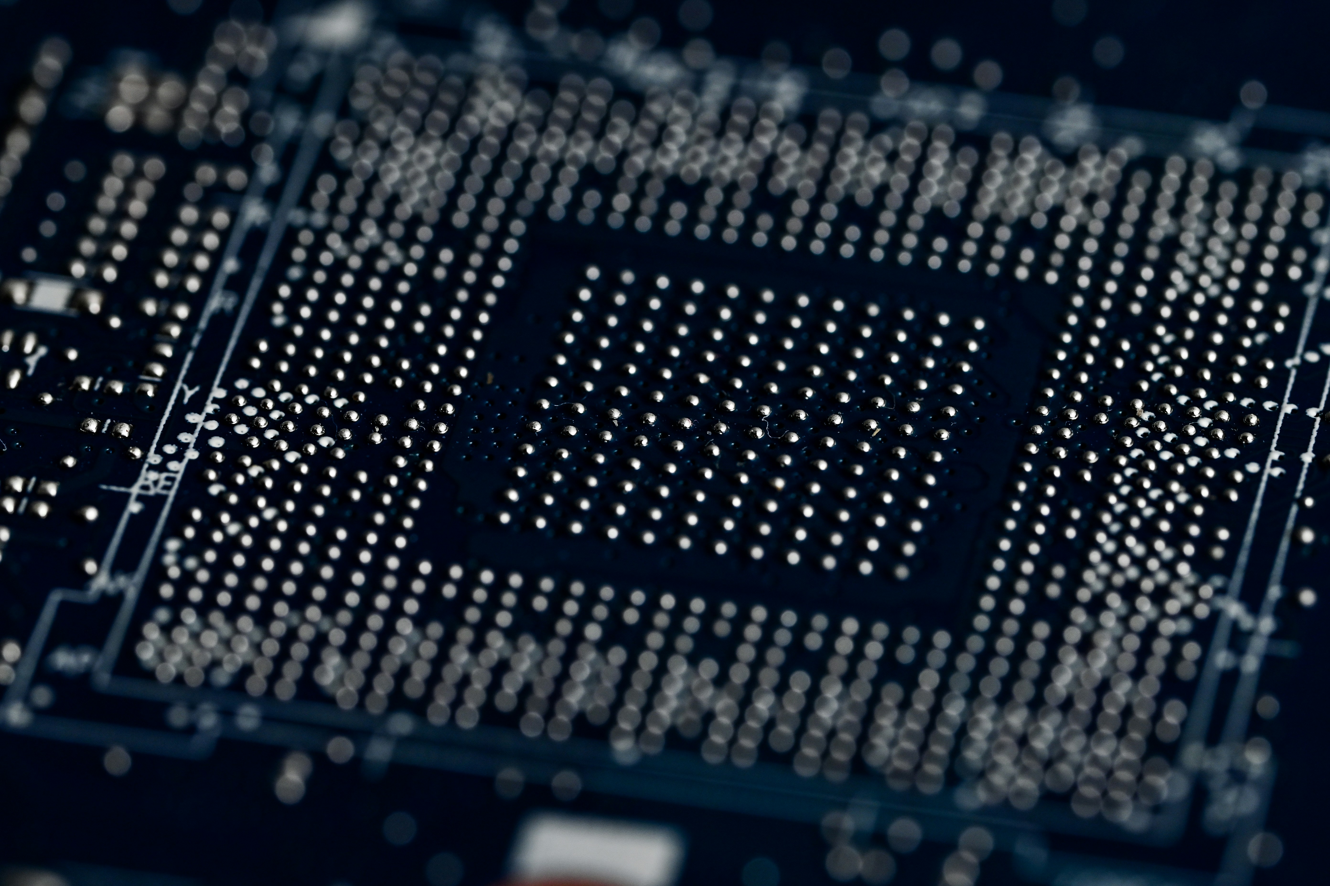 Close-up of a computer processor with many pins photo – Free ...