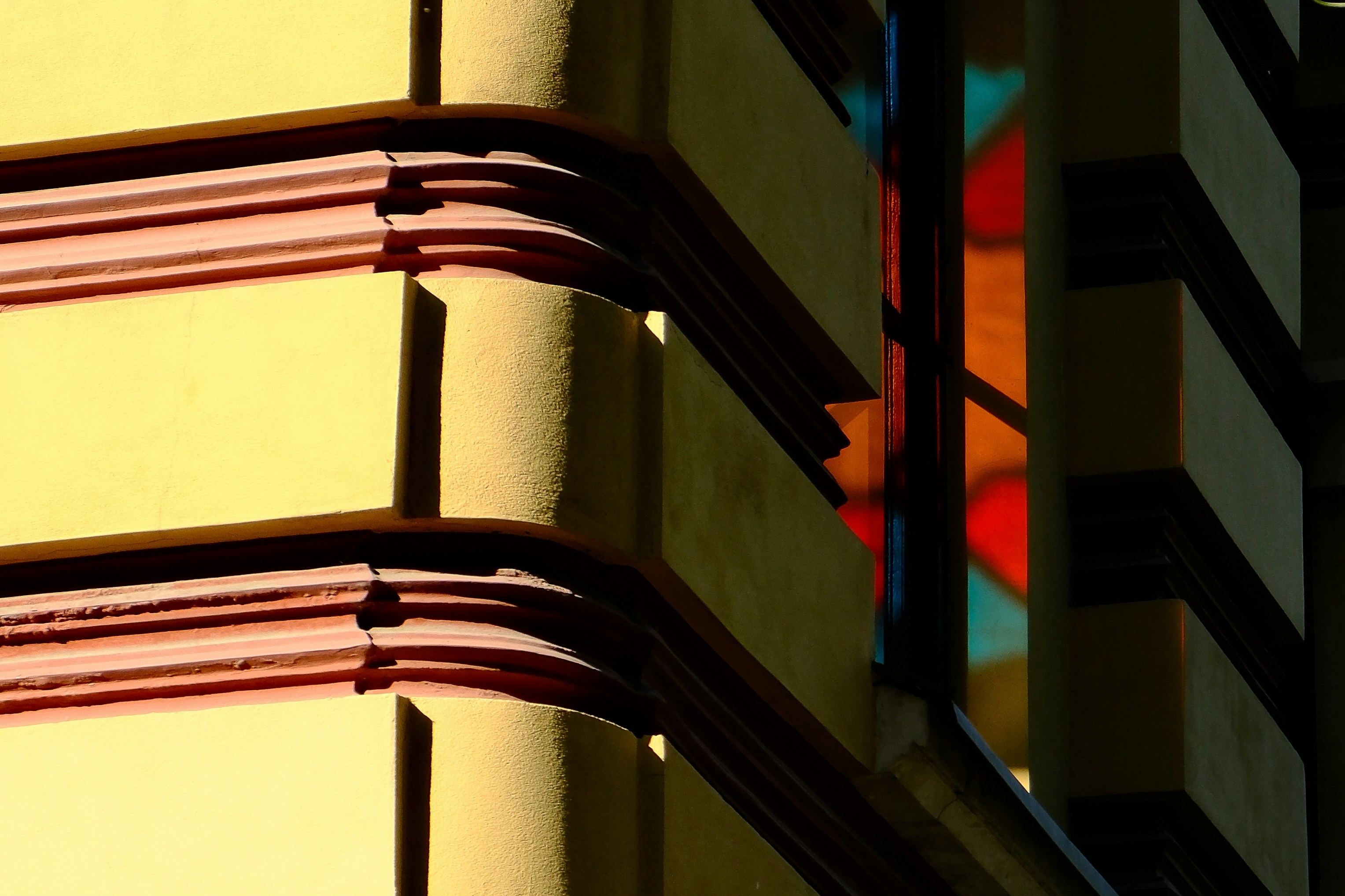 Chromatic Echoes on a Sunlit Facade