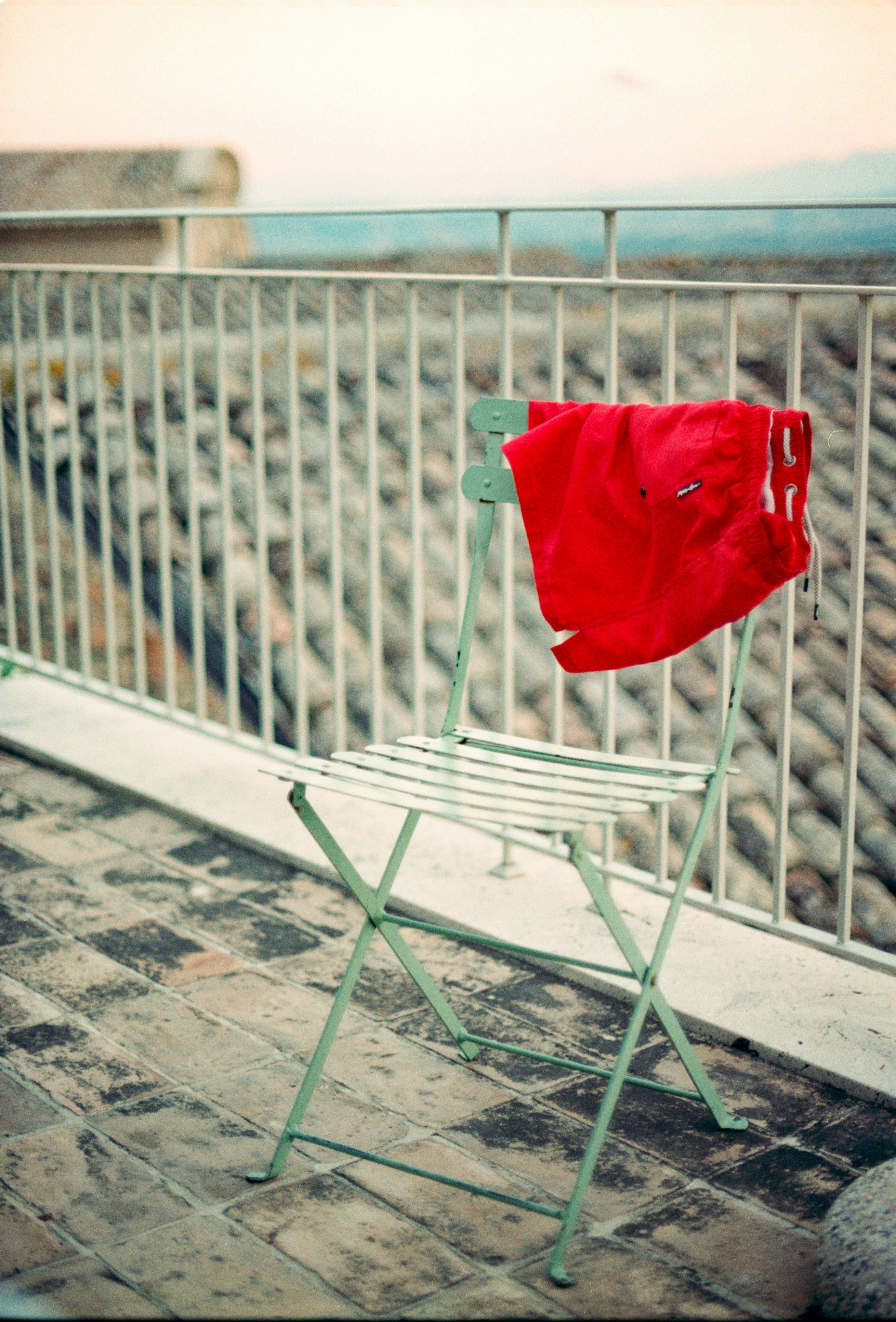 Lone Chair with a Splash of Red