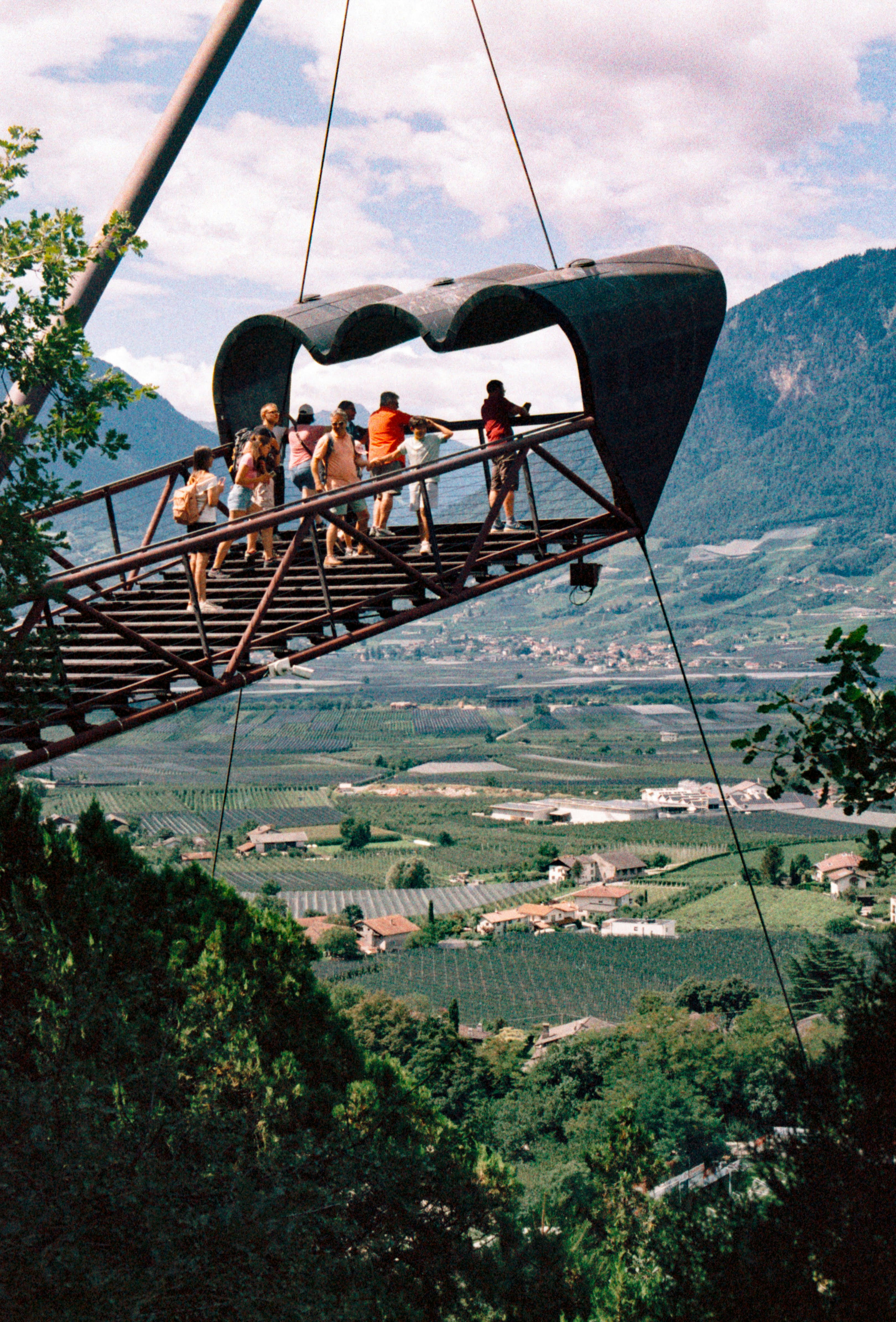 Suspended Viewing Deck Over a Patchwork Alpine Valley
