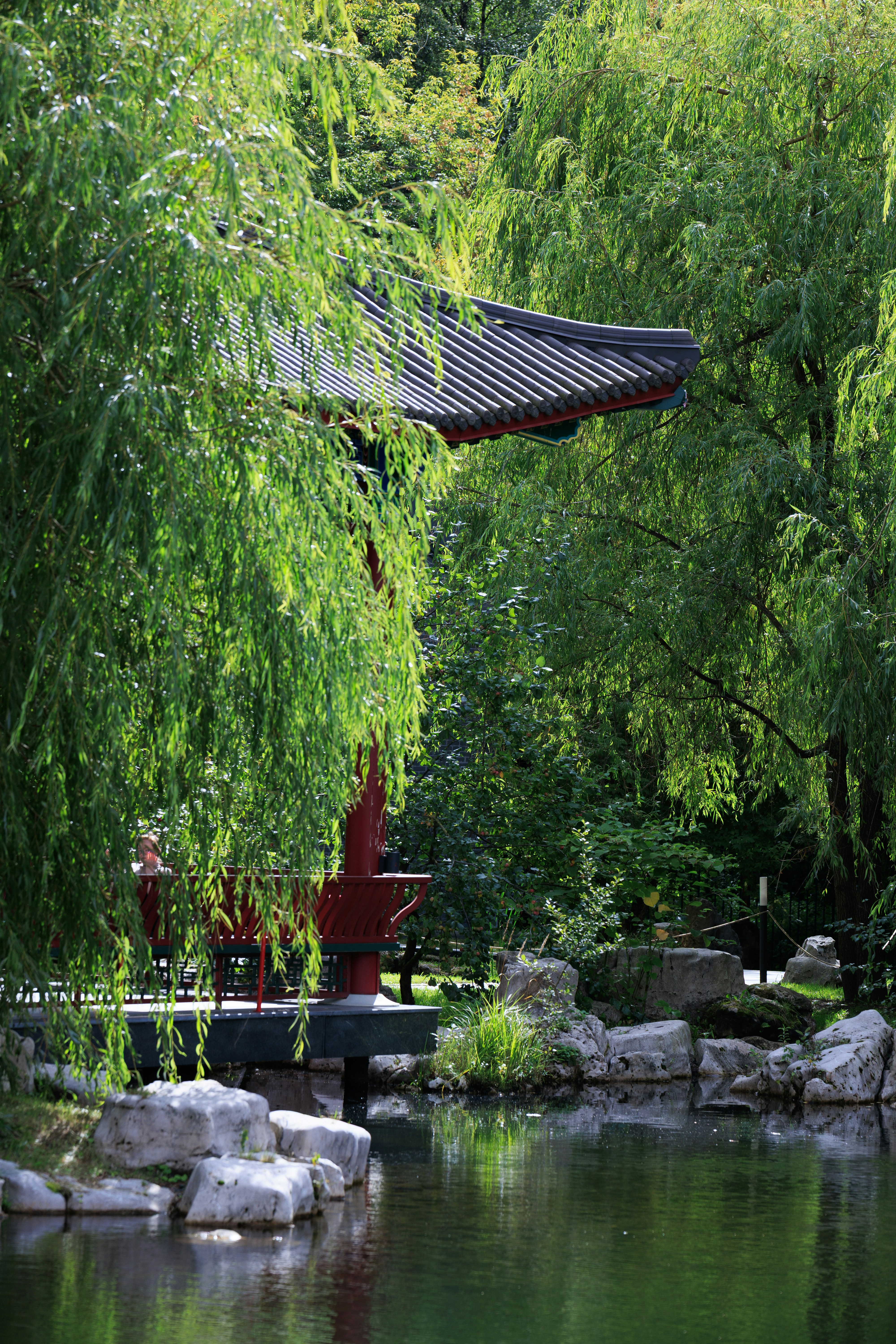 Tranquil japanese garden with a pagoda and pond