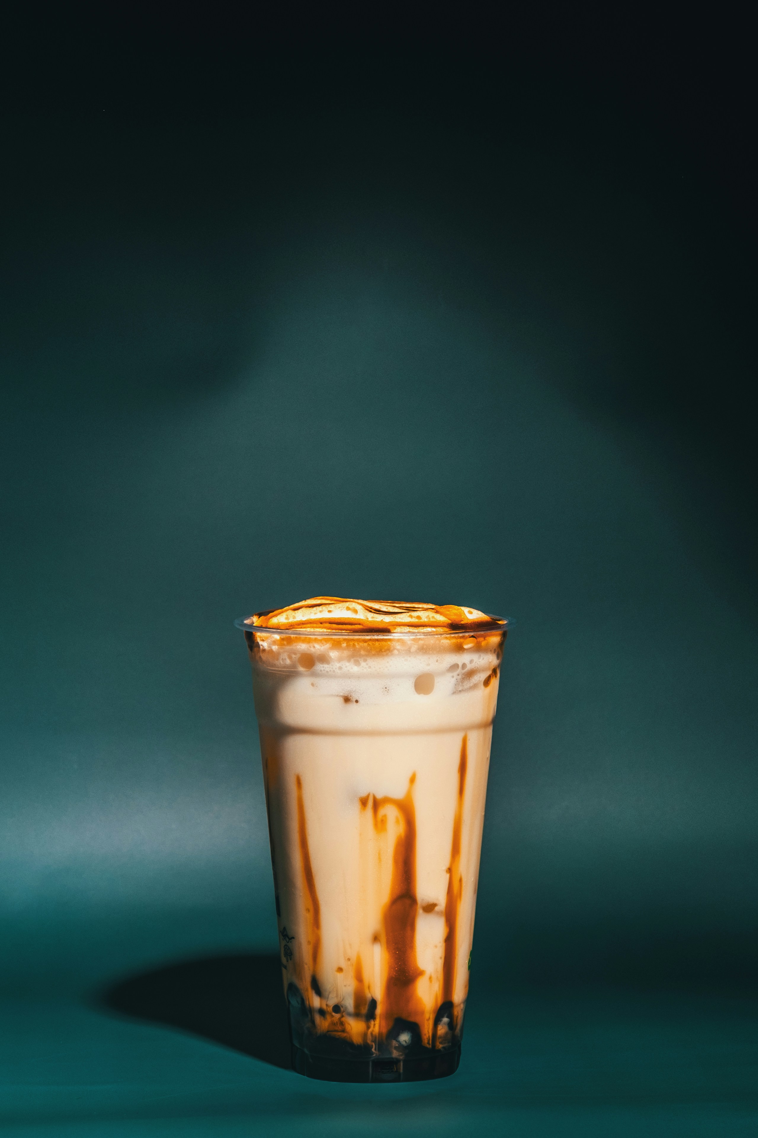 A creamy beverage with caramel swirls and tapioca pearls. photo – Free ...