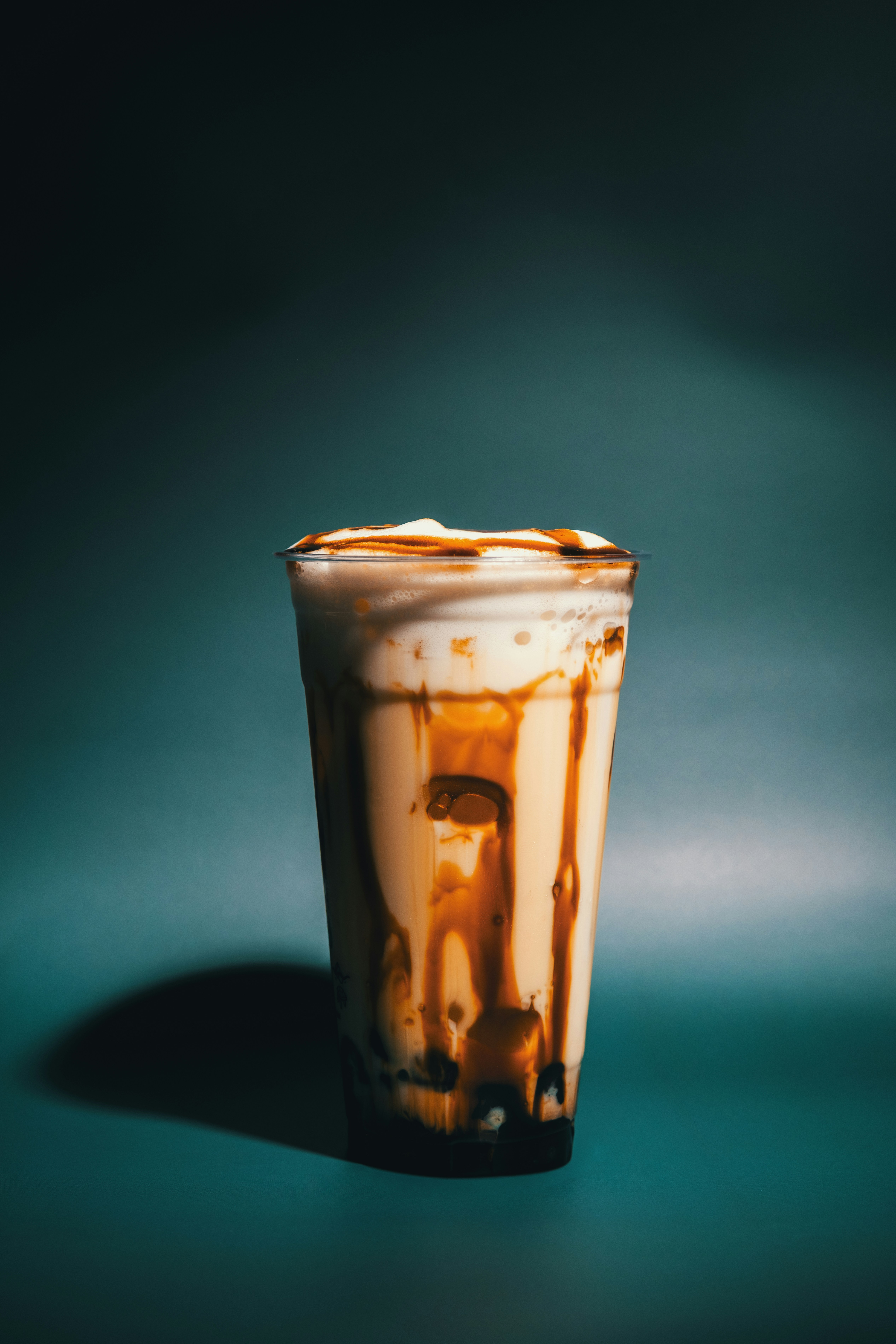 Brown sugar bubble tea with cream and caramel drizzle photo – Free ...