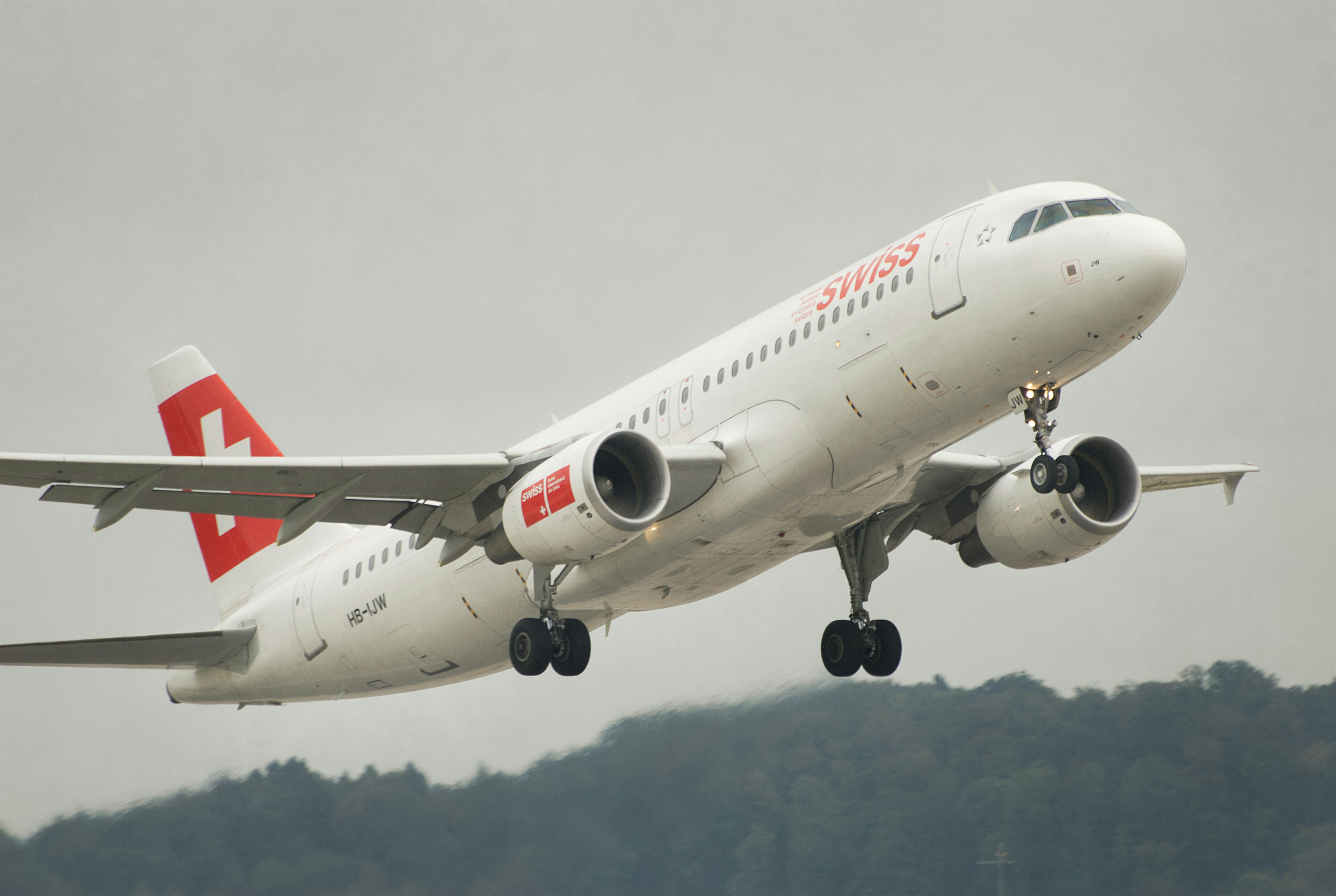Airbus A320-200 takeoff @ ZRH | A swiss airplane ascends into the sky.