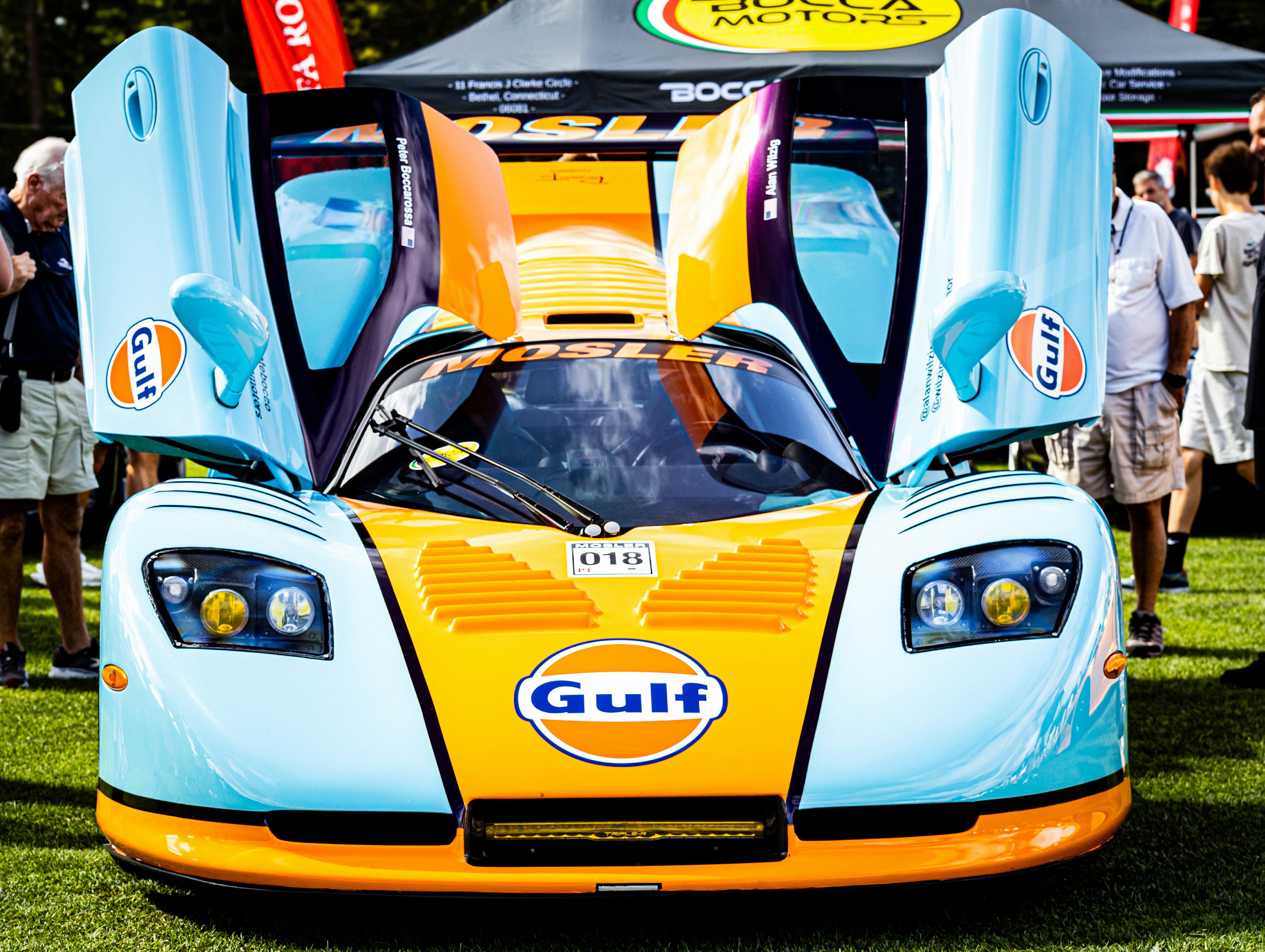 Gulf Front-View Showpiece: Butterfly-Door Racer in Bold Blue and Orange