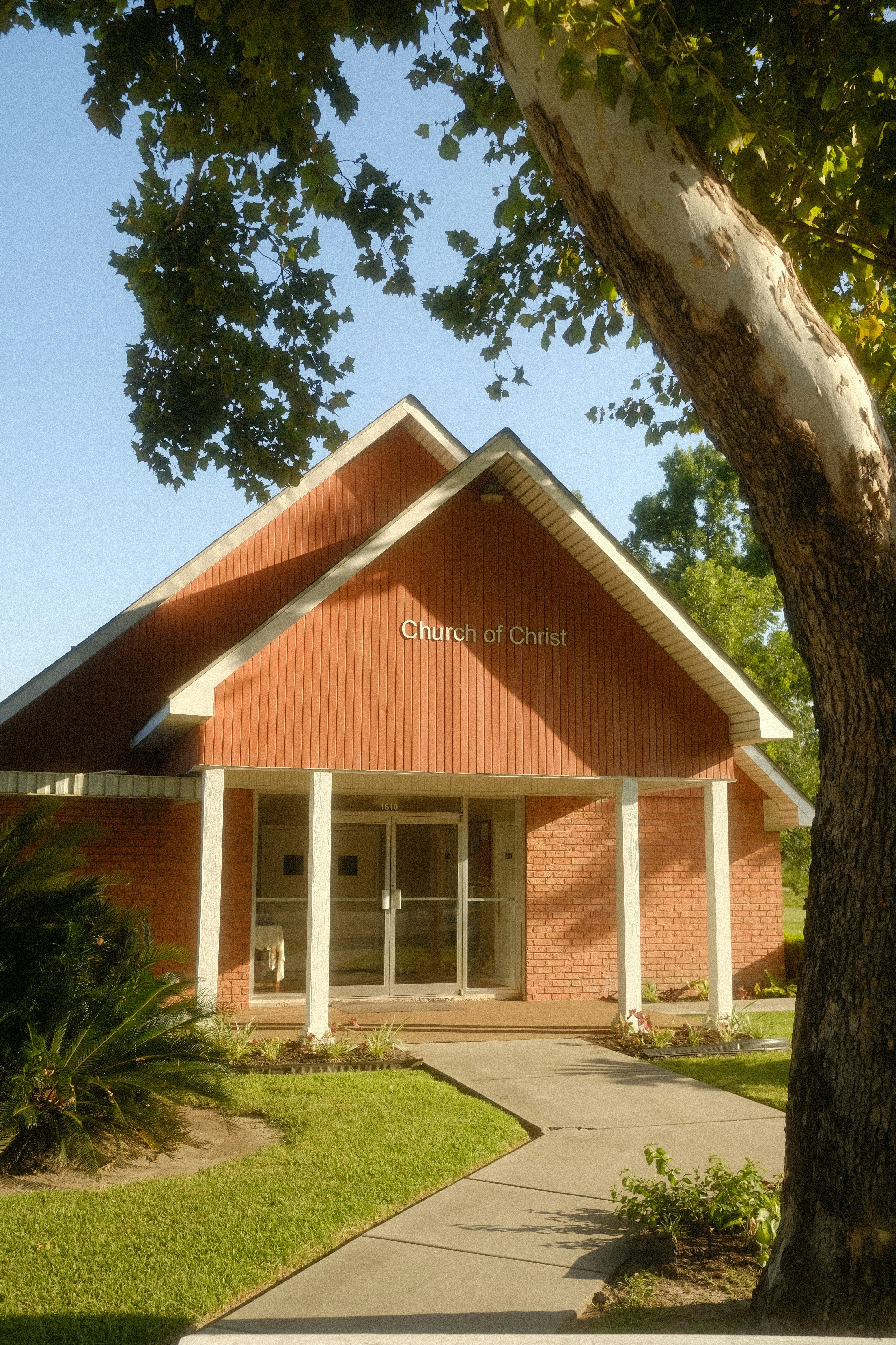 Church of christ building with a walkway.