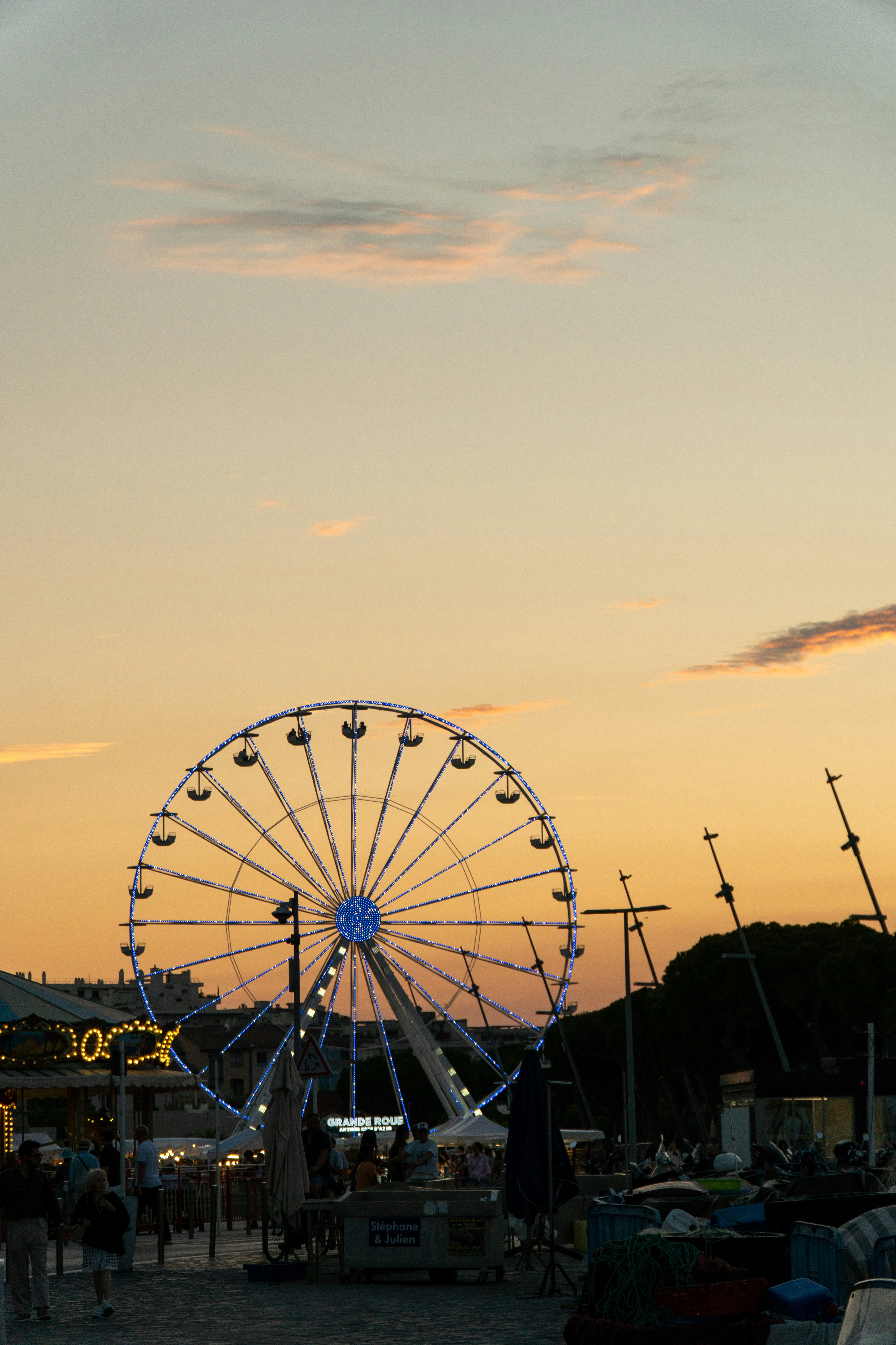 Twilight Whirl: The Ferris Wheel's Evening Glow
