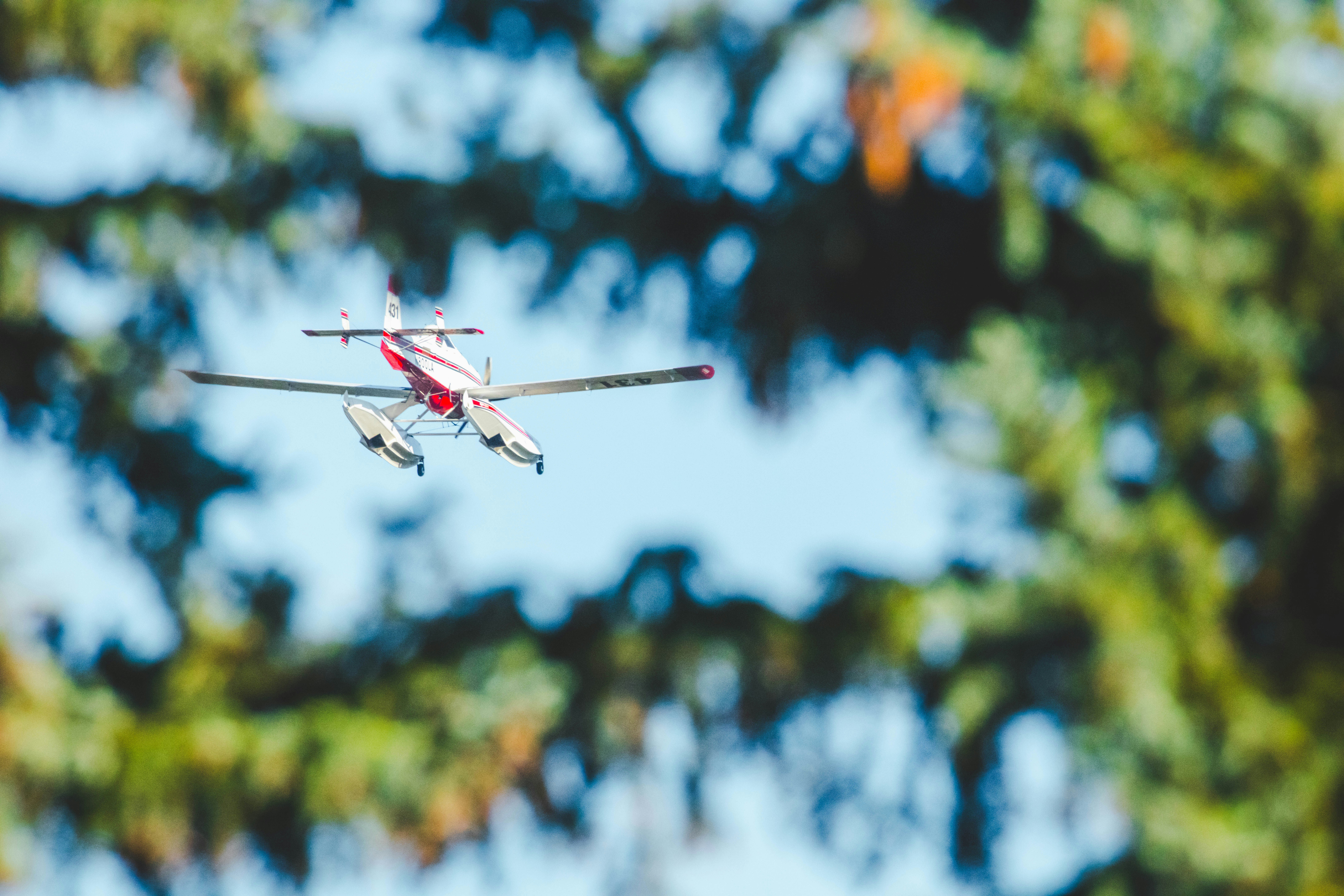 Miniature Rescue Helicopter Soars Above a Leafy Canopy