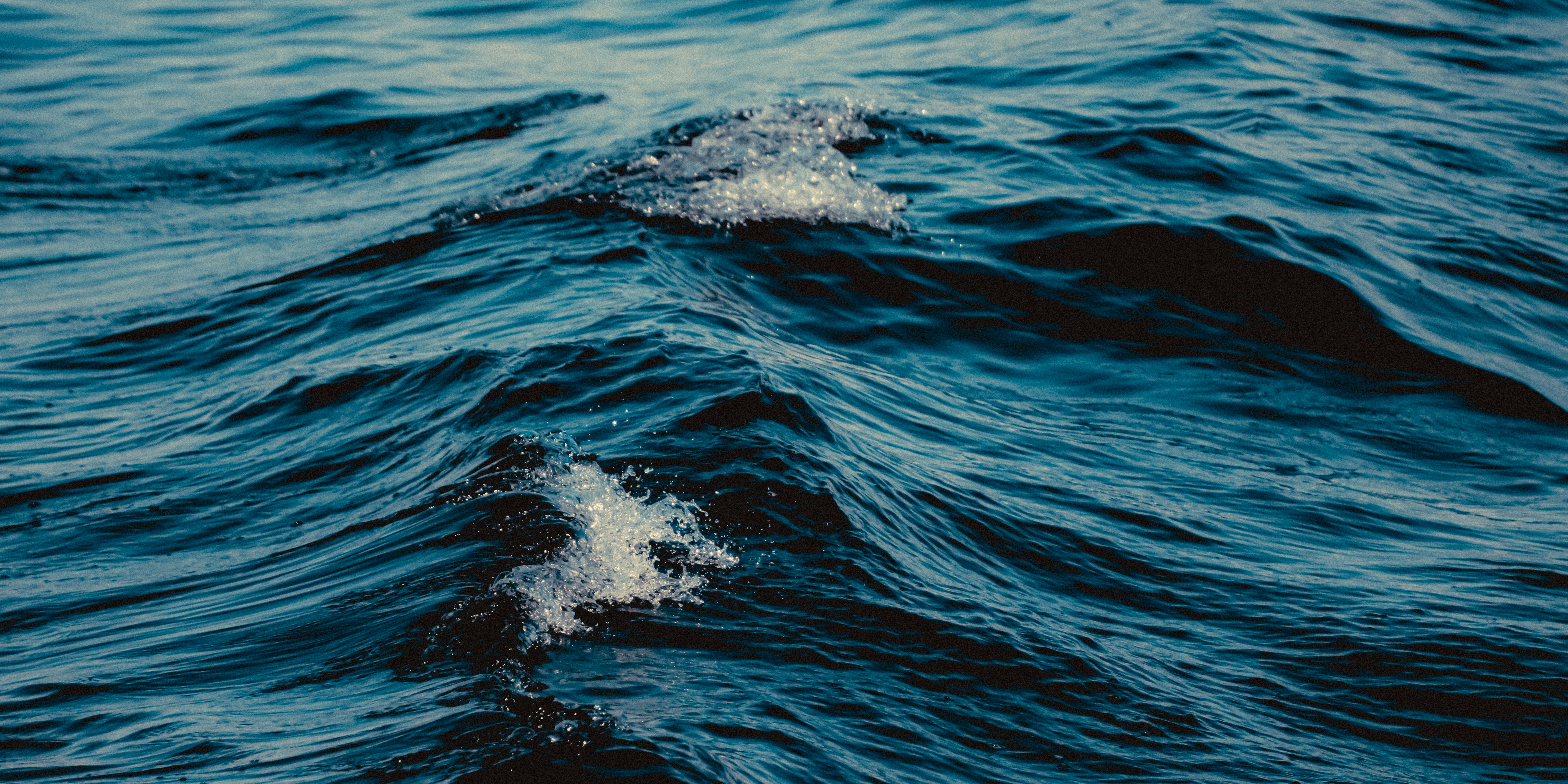 Rippling Reflections: A Dance of Water and Light