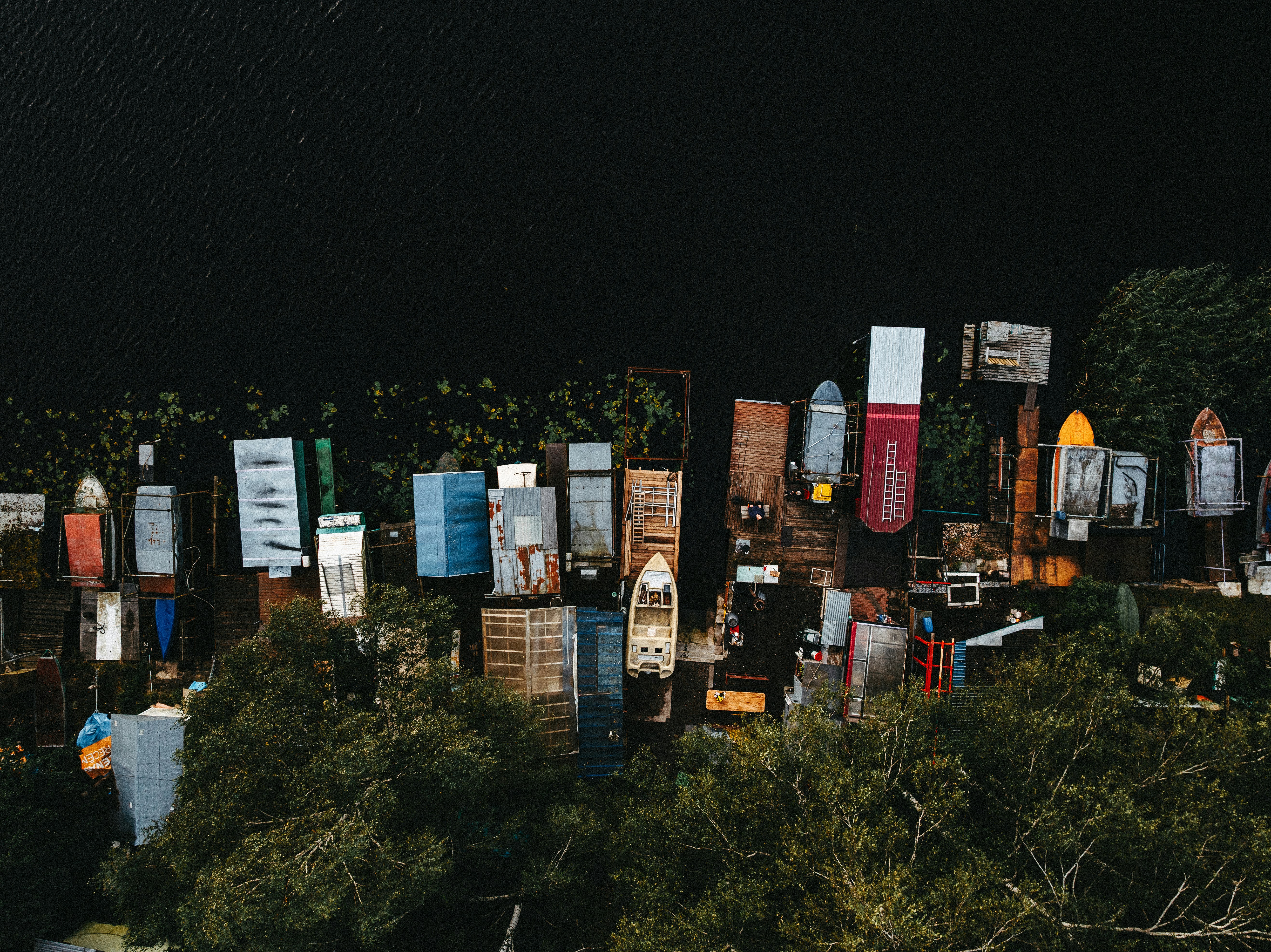 Aerial Mosaic of Watercraft and Nature
