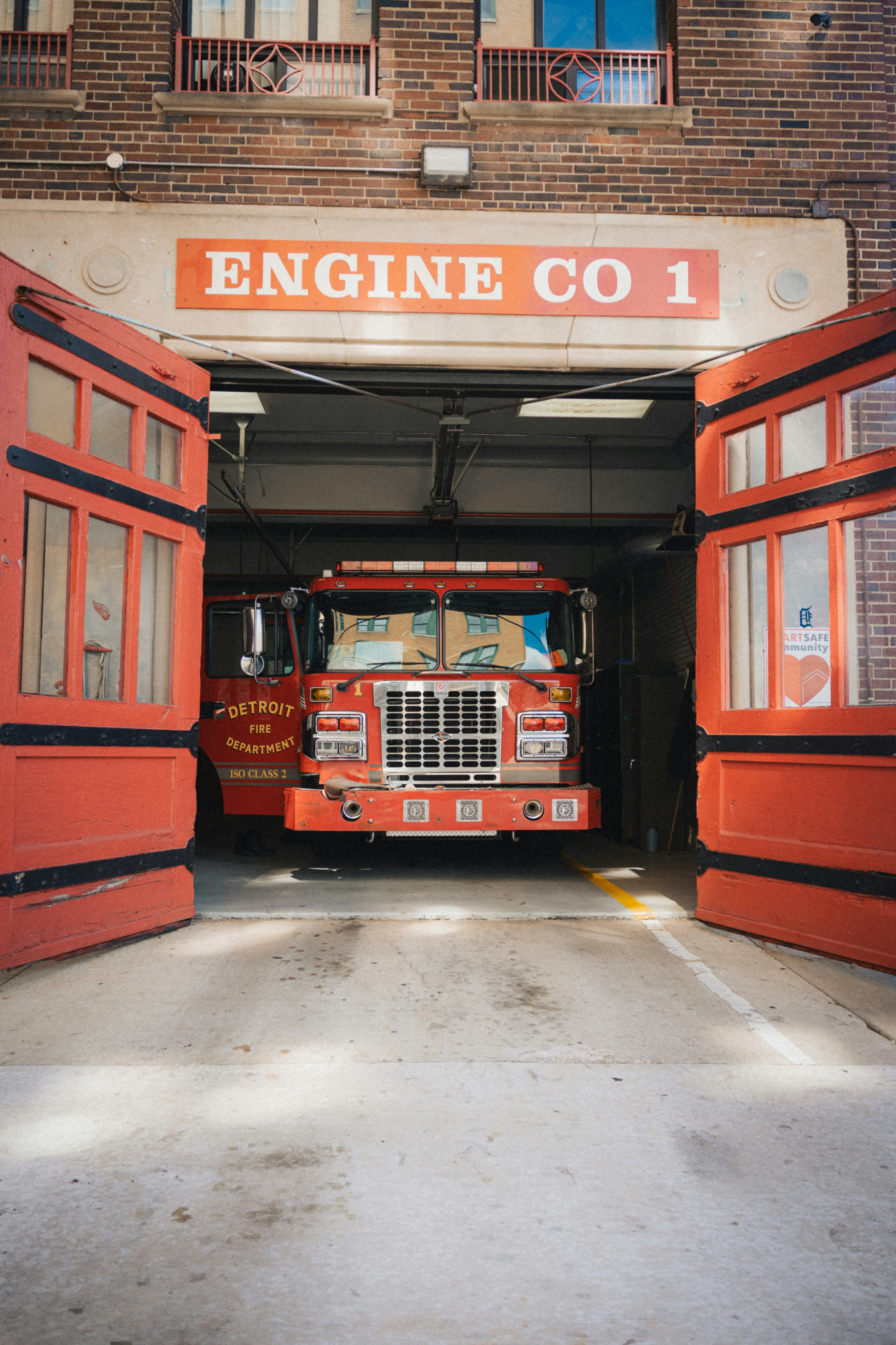 Red fire truck inside engine co 1 station photo – Free Fire Image on ...