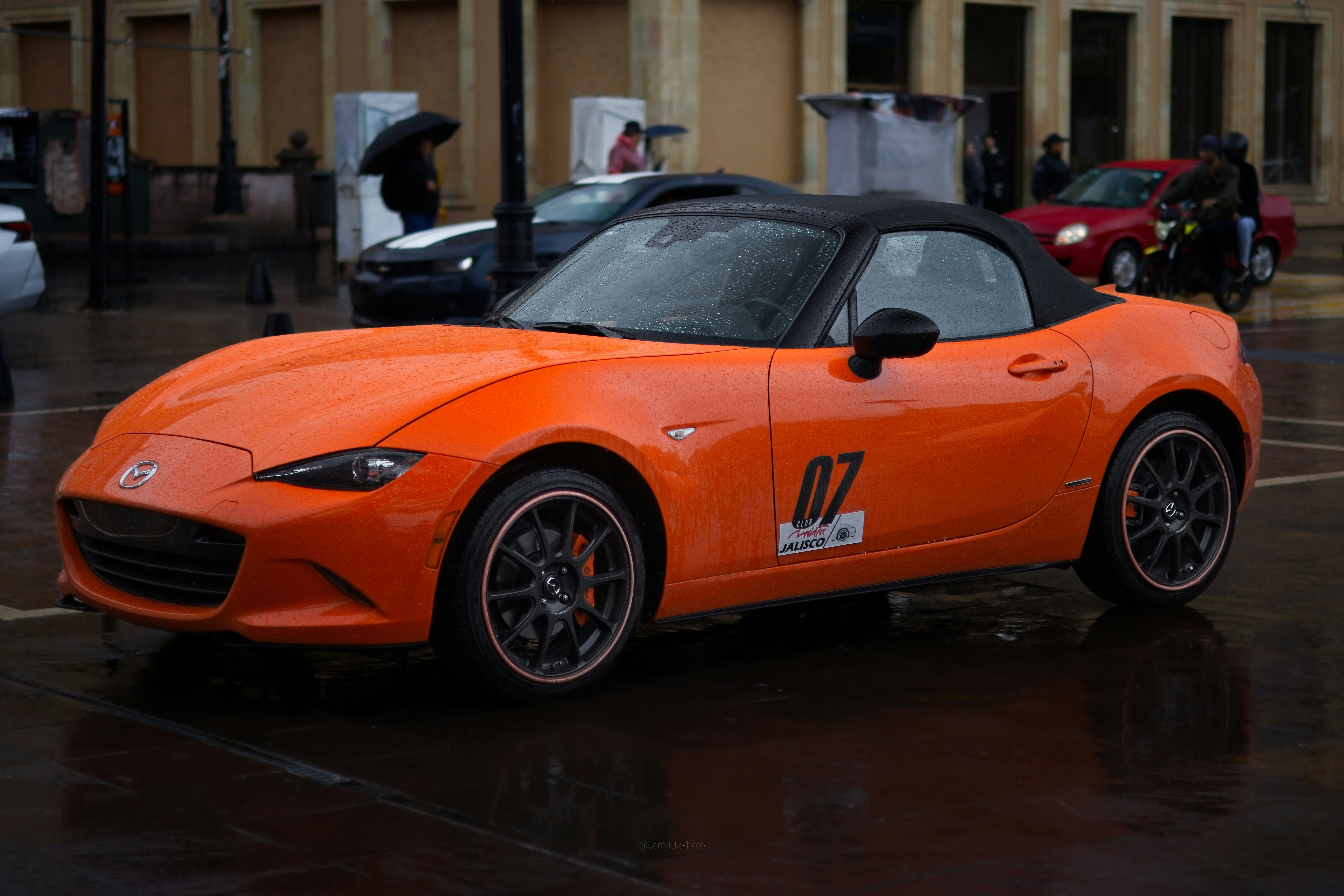 Racing Spirit in Urban Rain