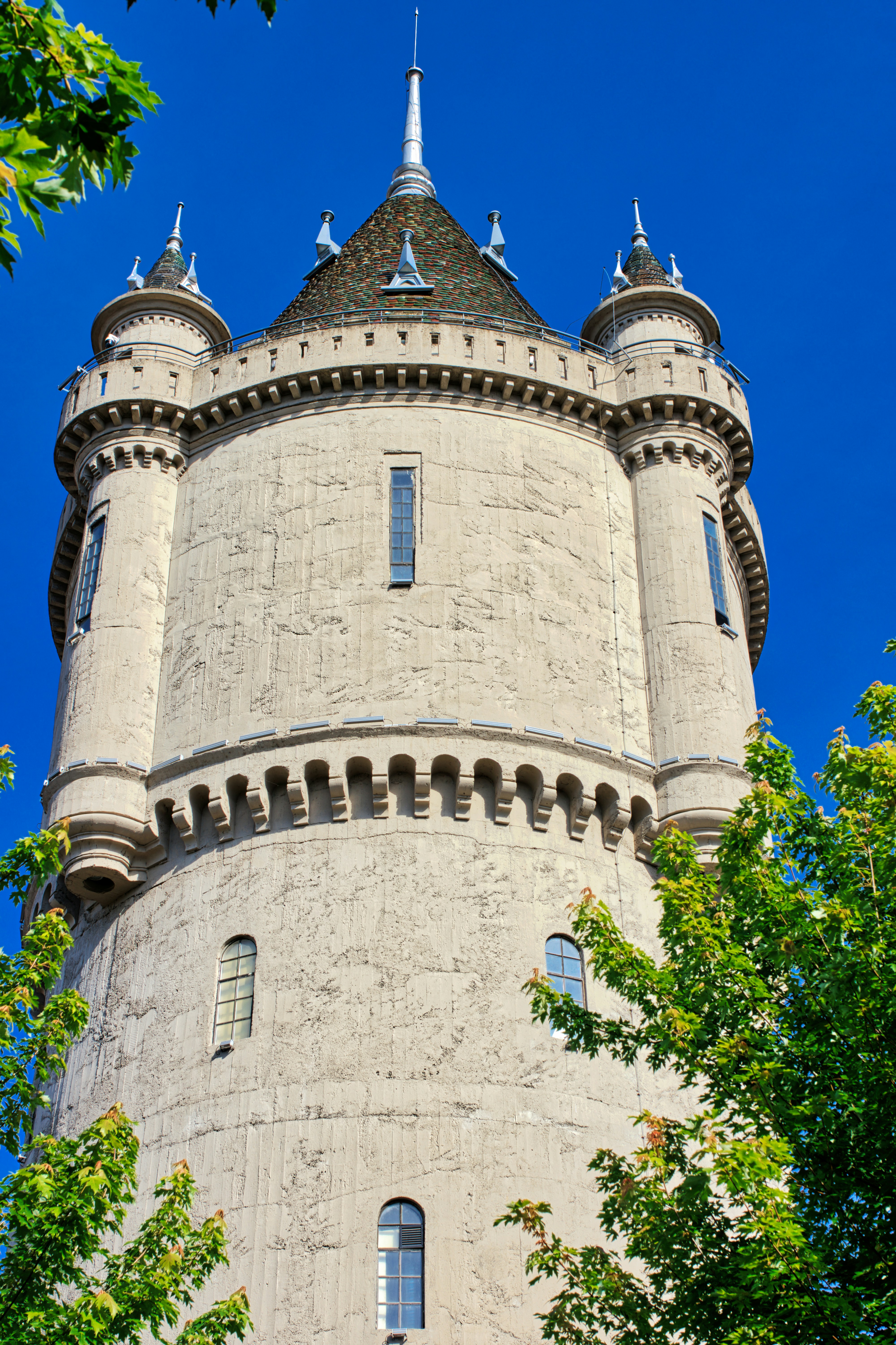 The water castle in Drobeta Turnu Severin | A tall, ornate tower against a bright blue sky