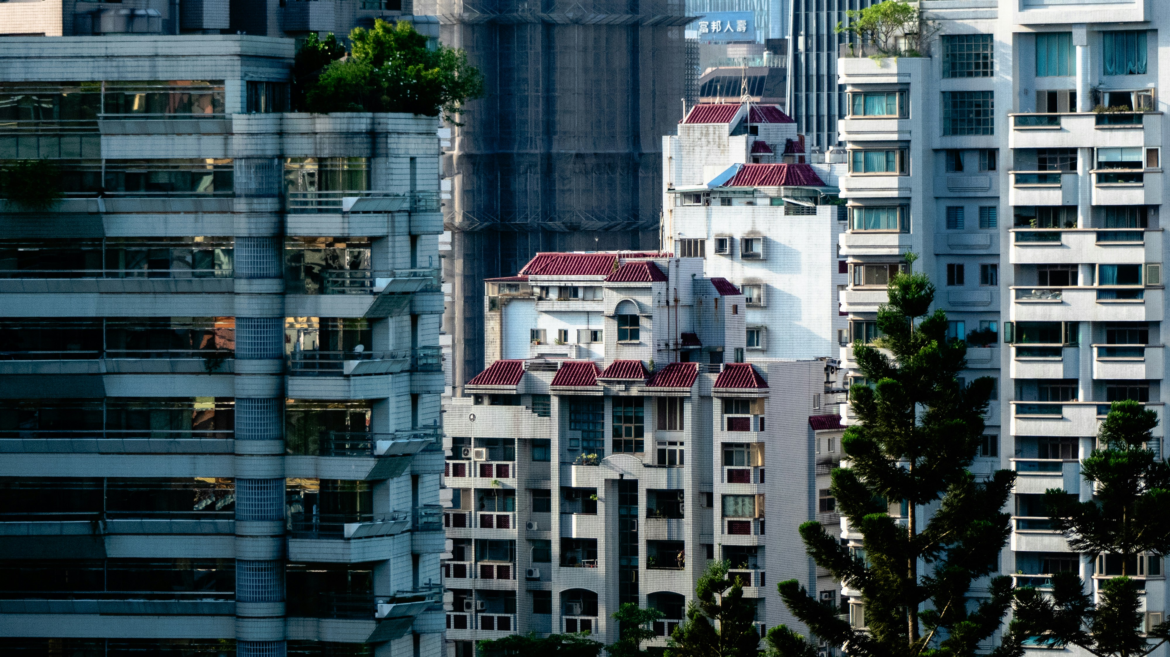 Modern high-rise buildings with reflective windows and balconies. photo ...