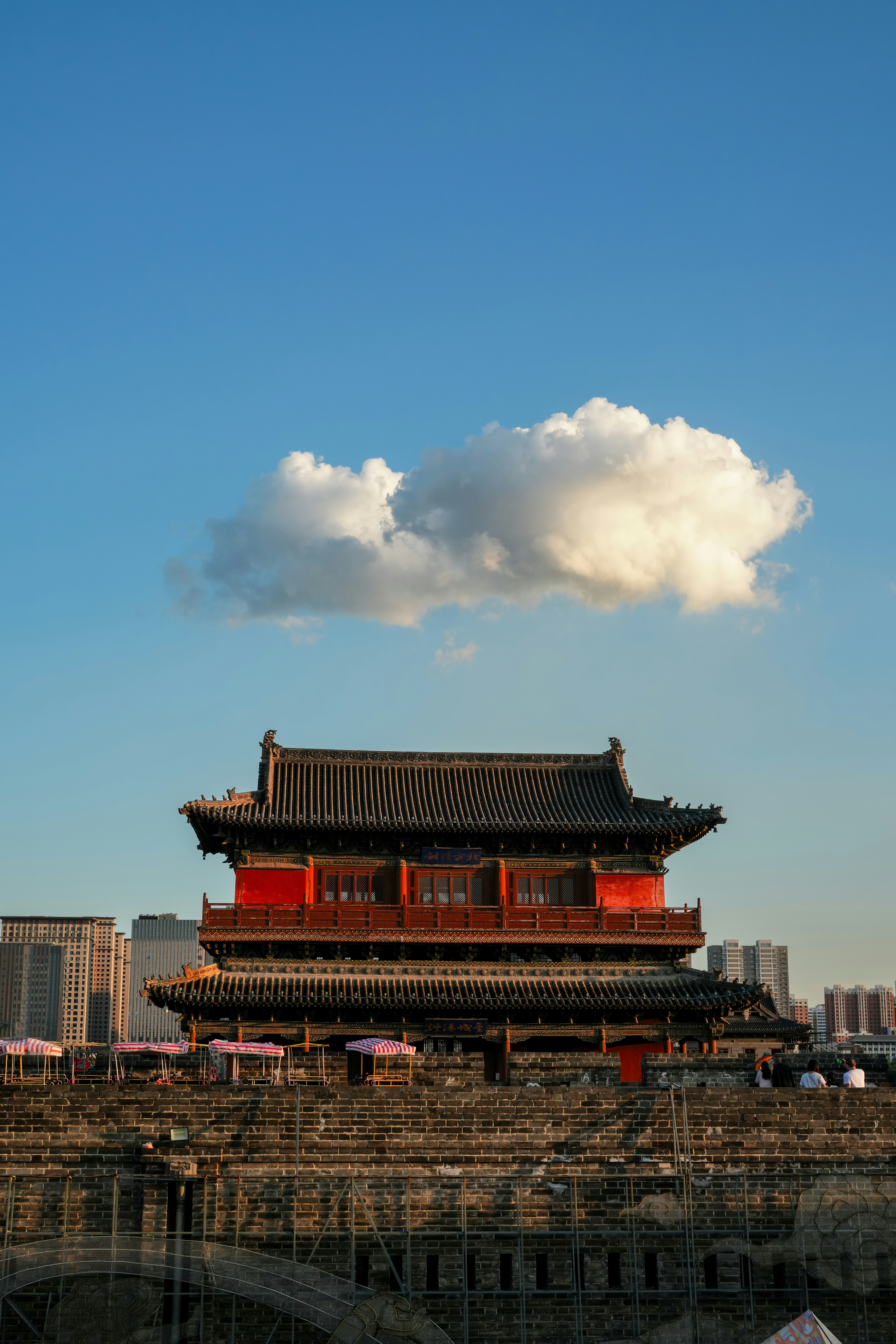 Ancient chinese building under a cloudy blue sky