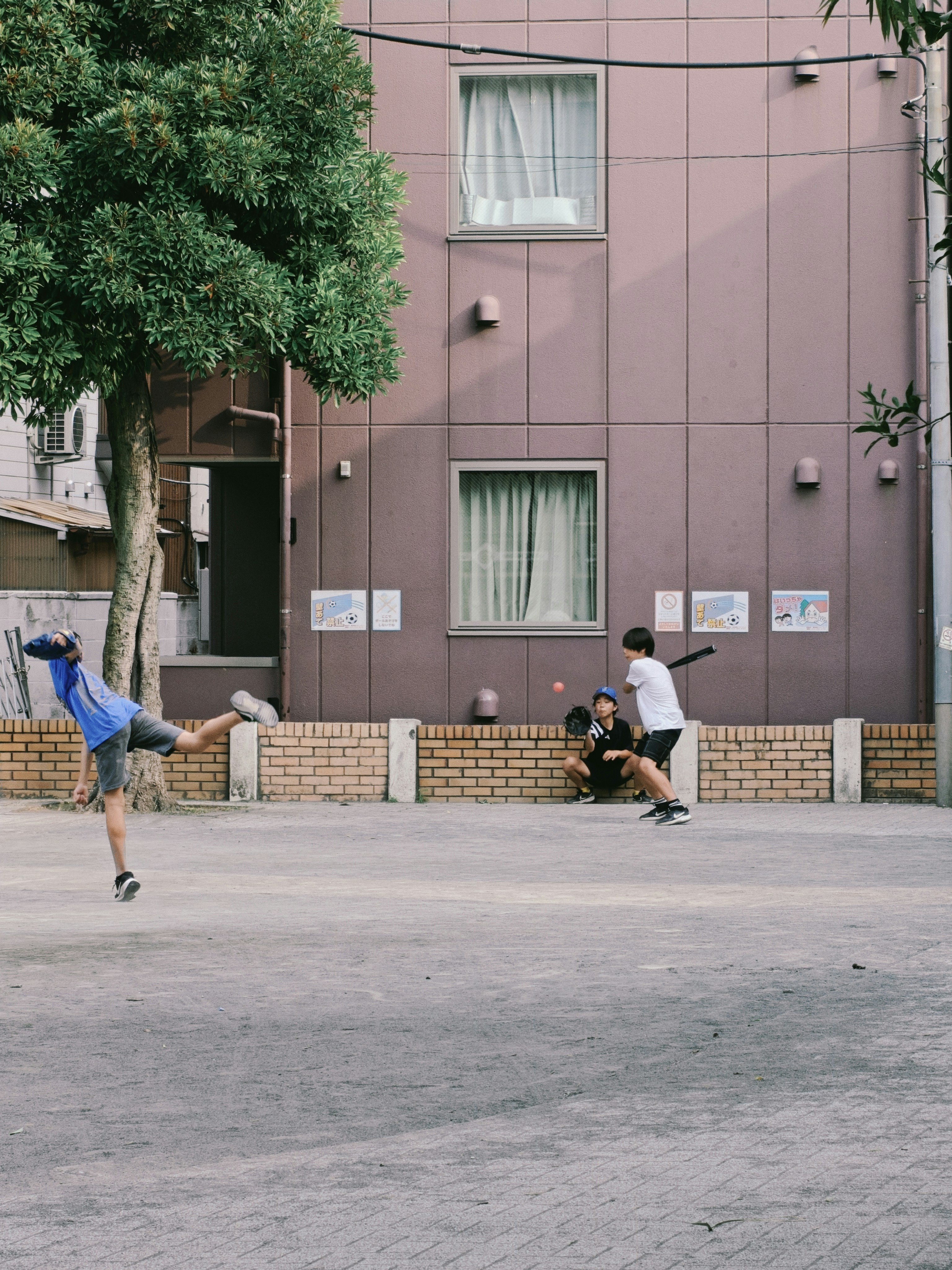 Memories for life. | Boys playing baseball in a park