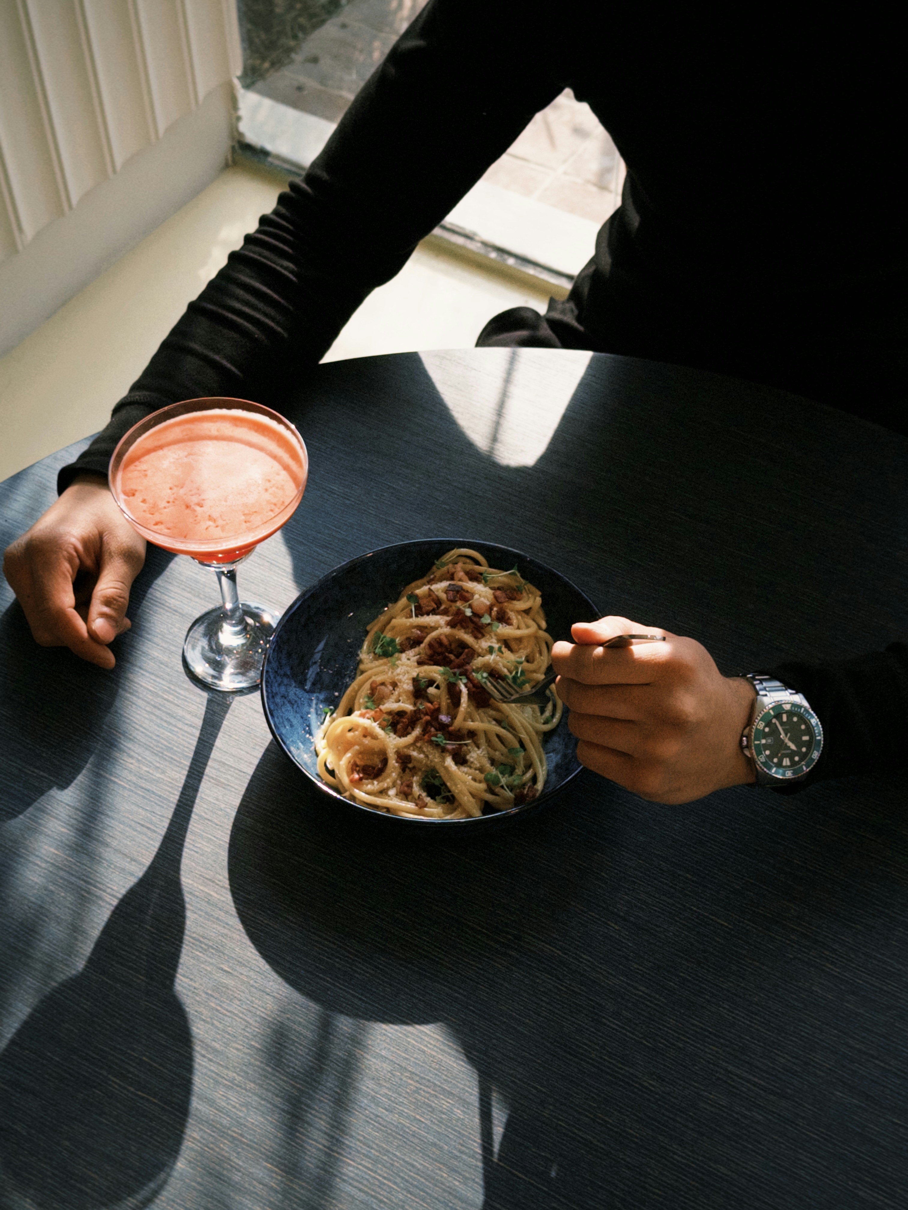 Midday Pause: Pasta, Cocktail, and Shadow Play