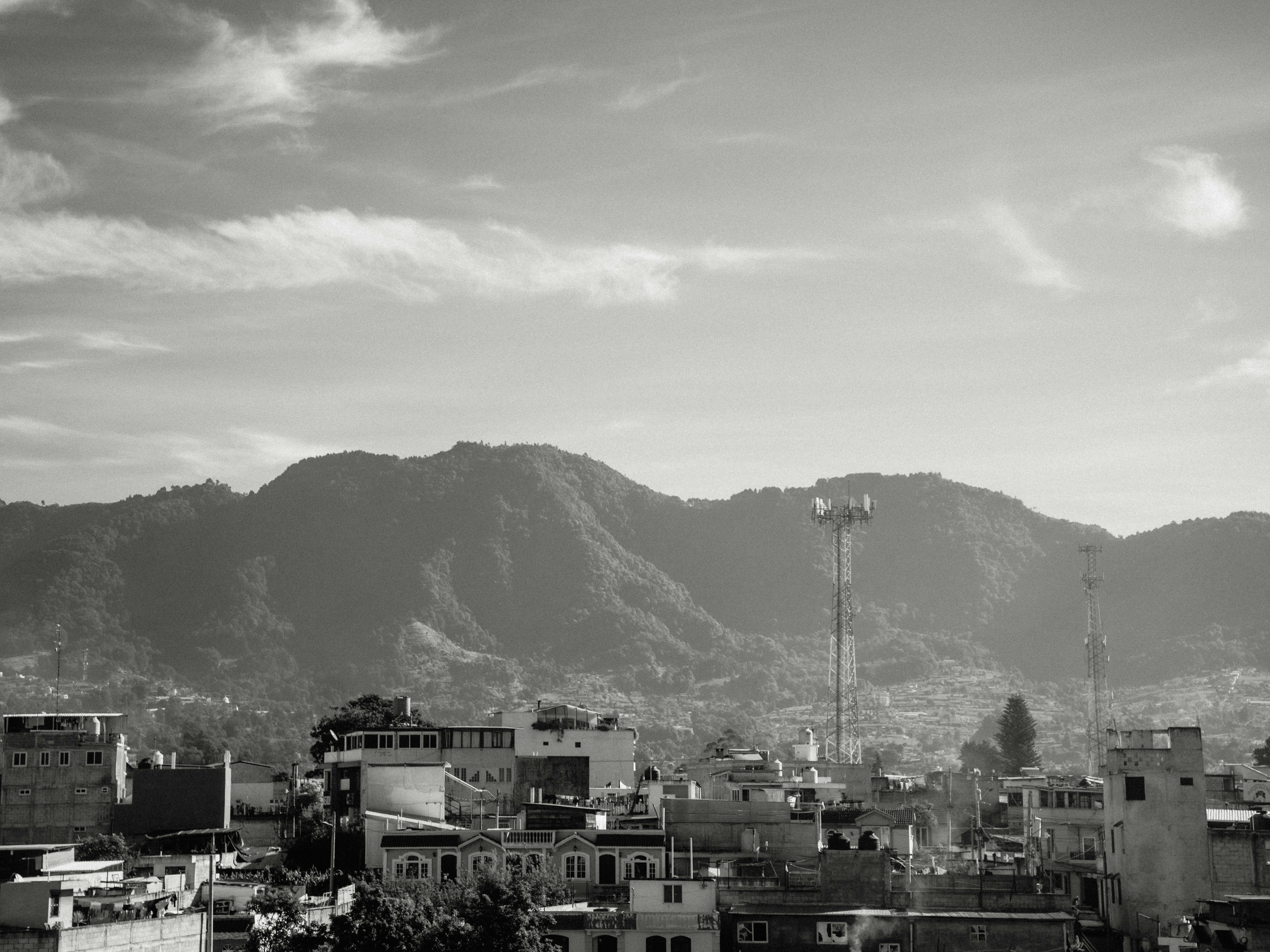 City skyline with mountains in the background