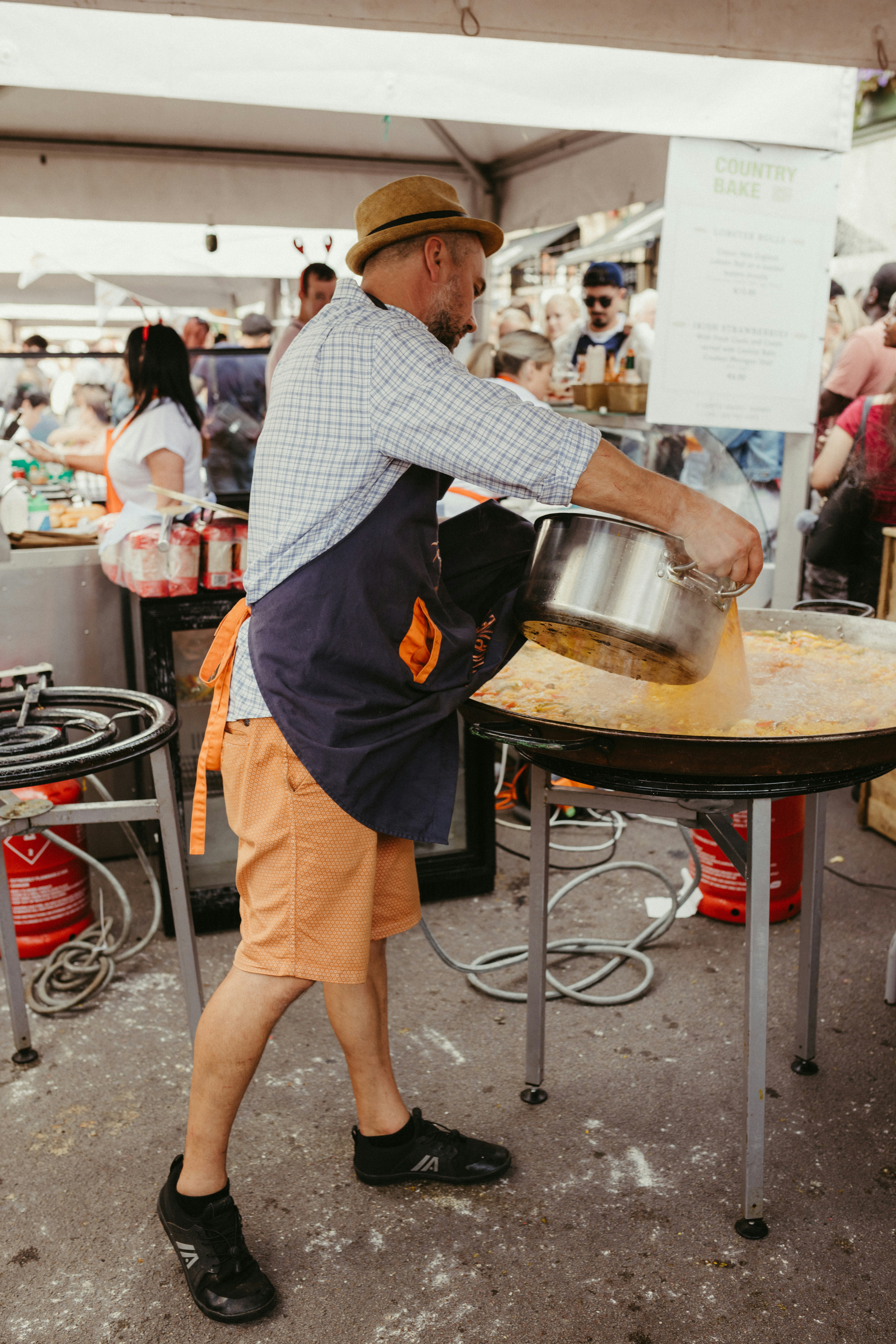 Culinary Craftsmanship Amidst the Crowd