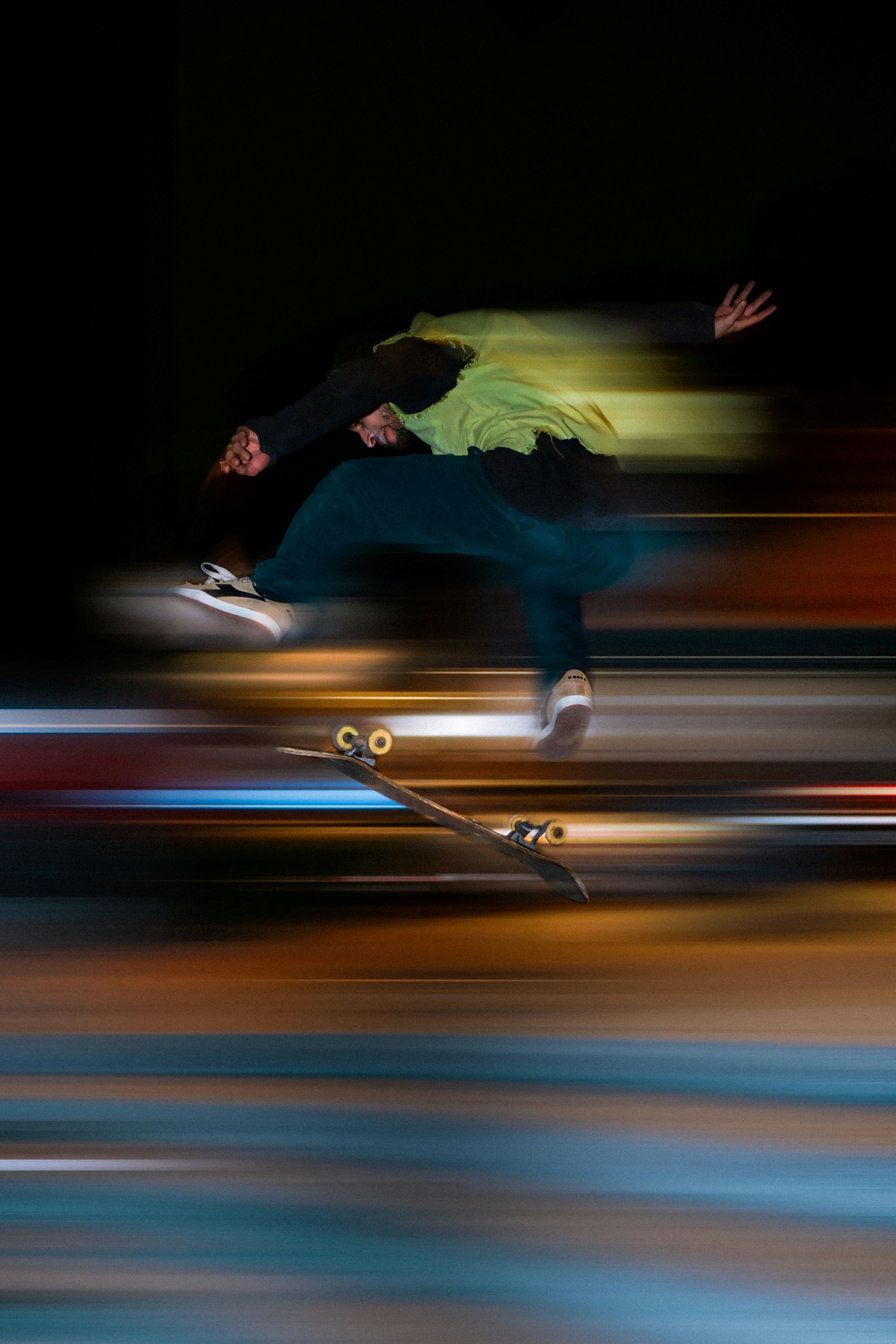 experiencing it | Skateboarder in mid-air with motion blur effect