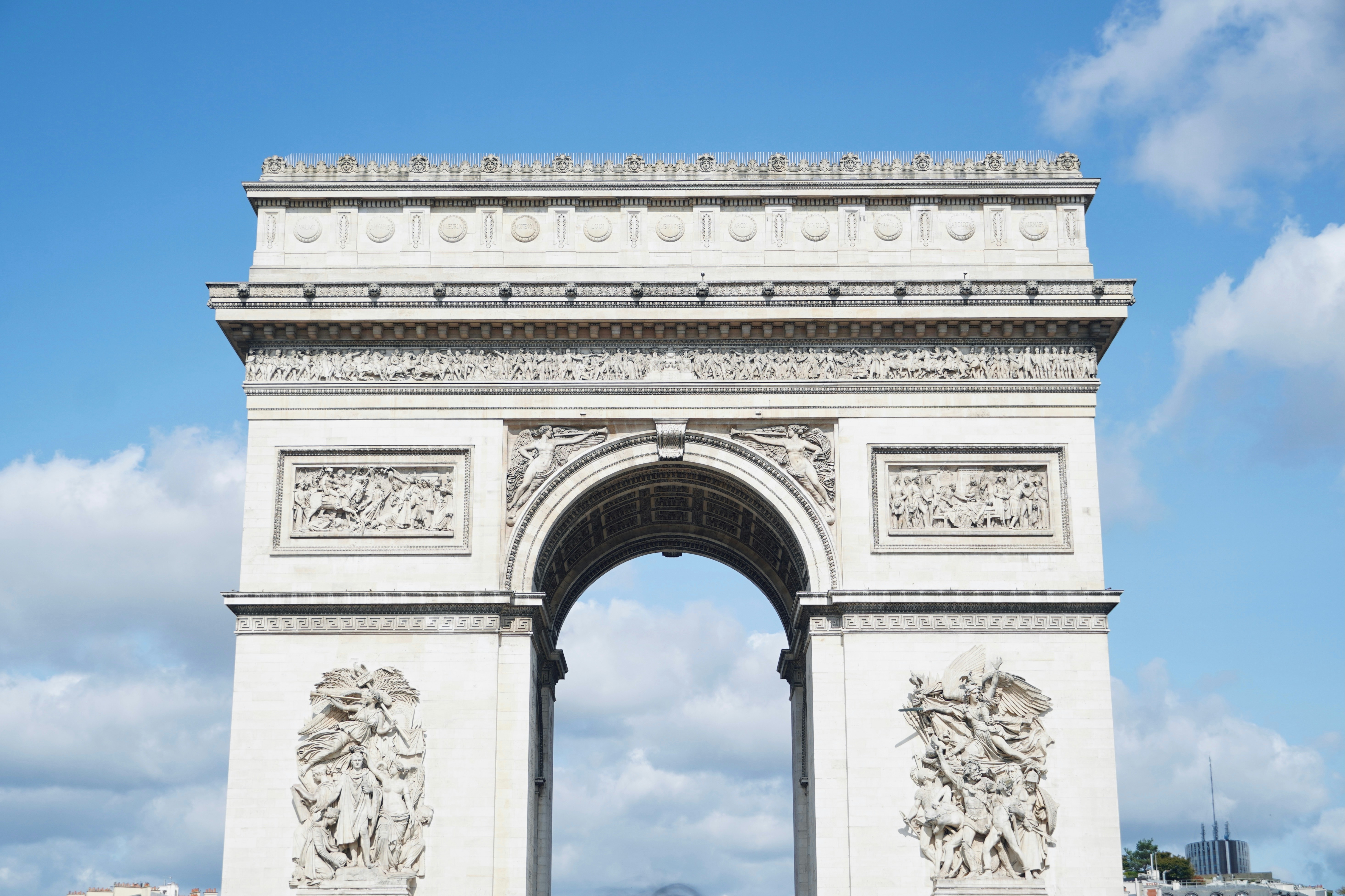 Arc of Quiet Grandeur: Monument under a Wide Blue Sky