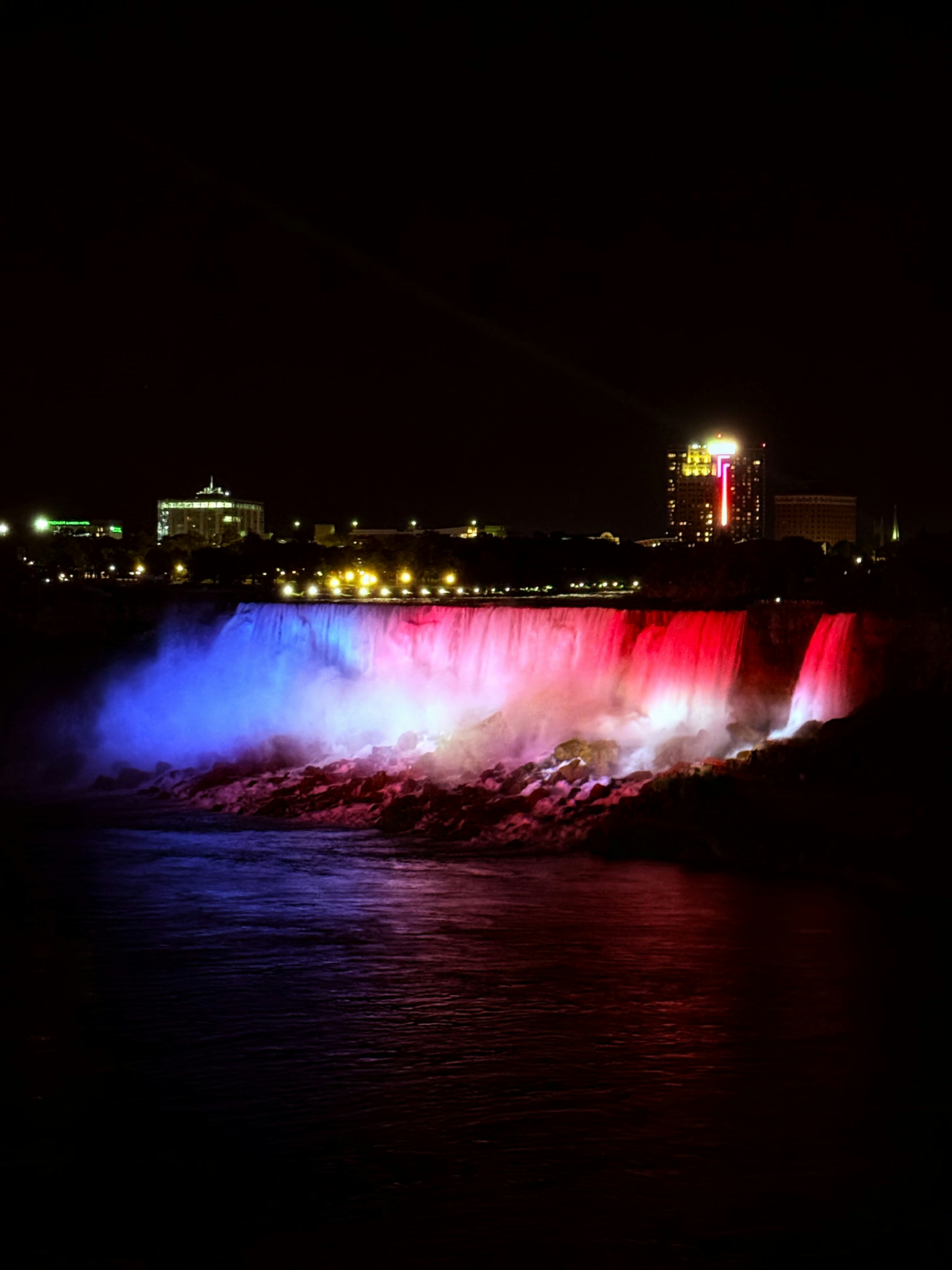 Illuminated Cascade: A Nighttime Symphony of Color