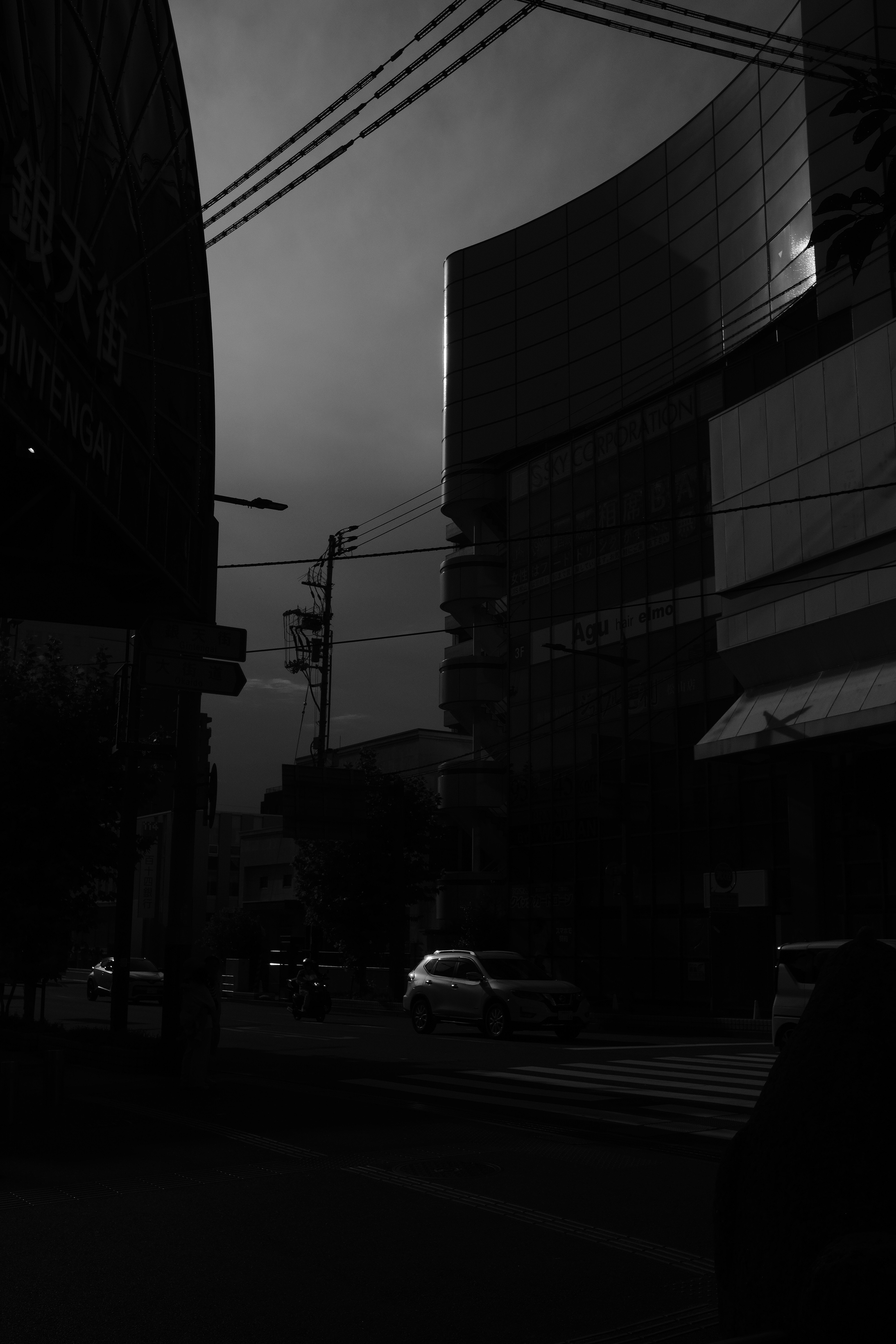Modern buildings and street scene at dusk