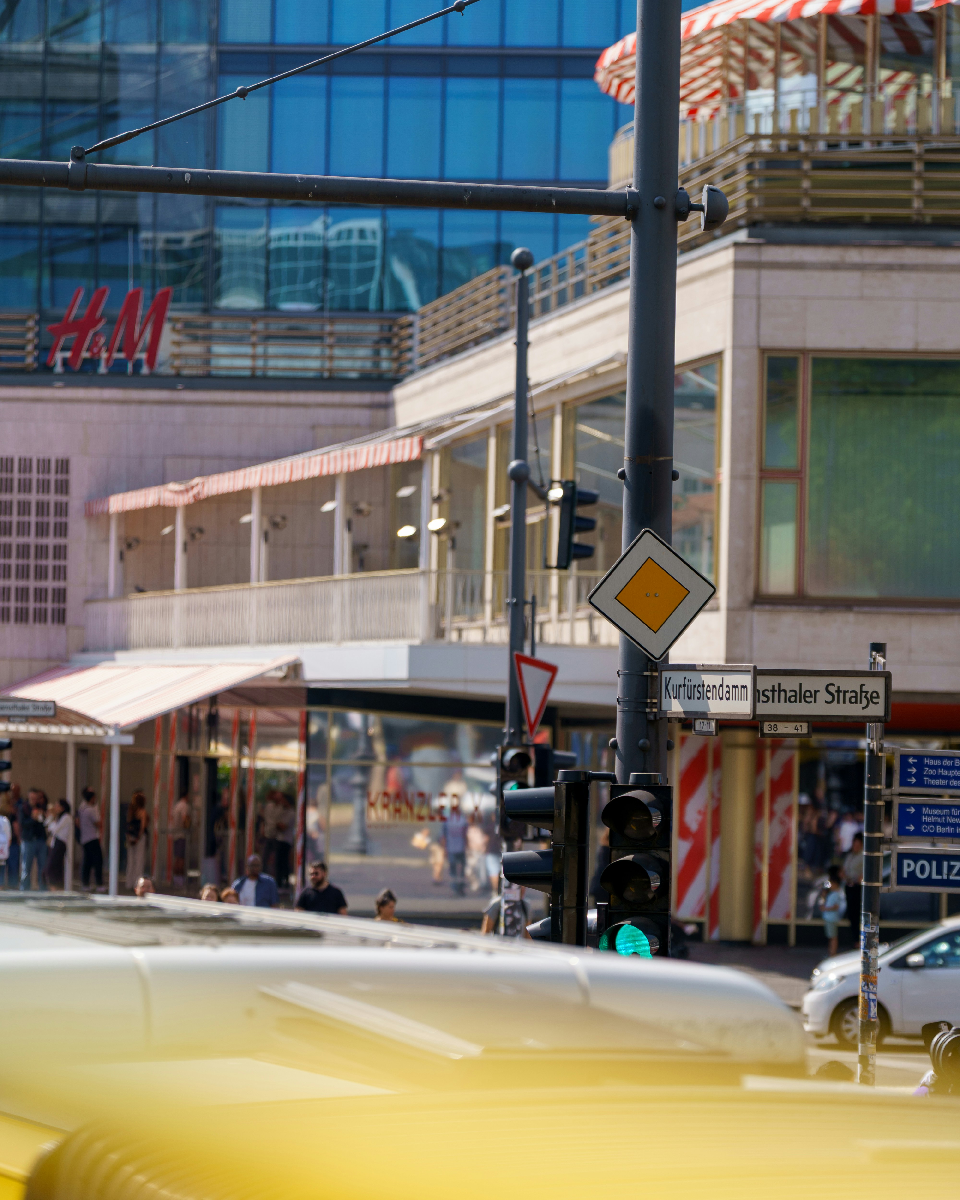 City street with h&m store and traffic lights