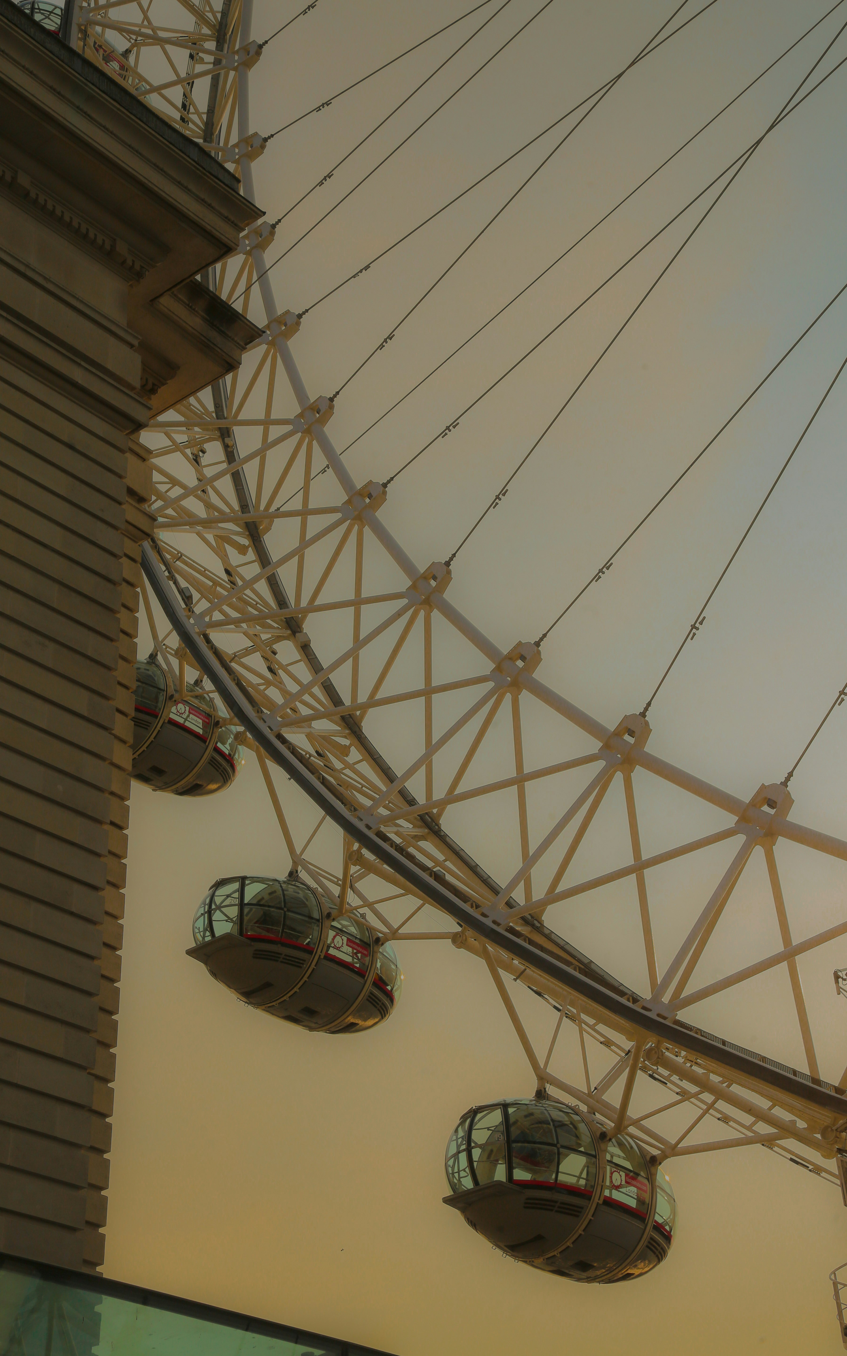 The Summer in London | London eye with gondolas against a hazy sky