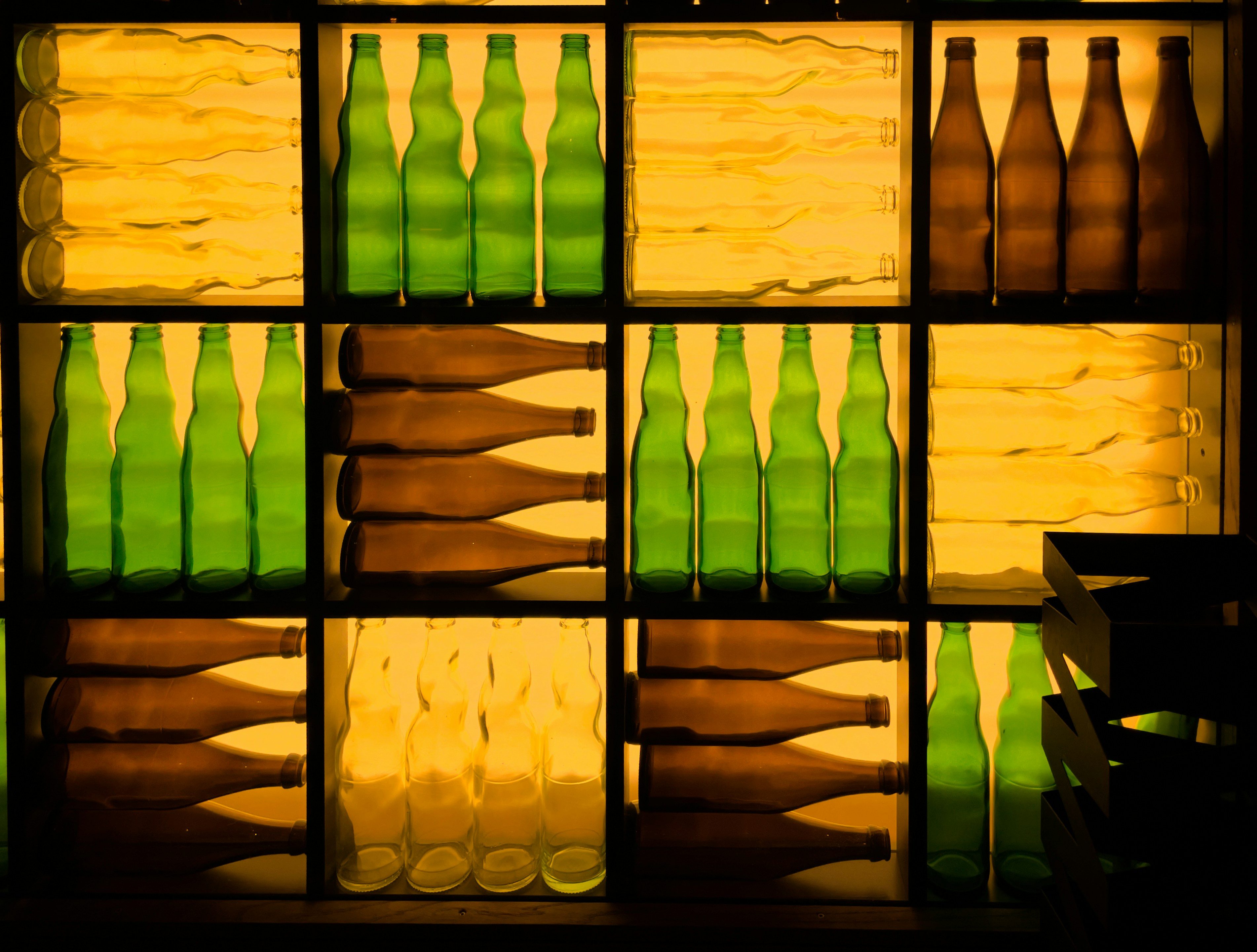 Illuminated Bottles: A Symphony of Color and Form