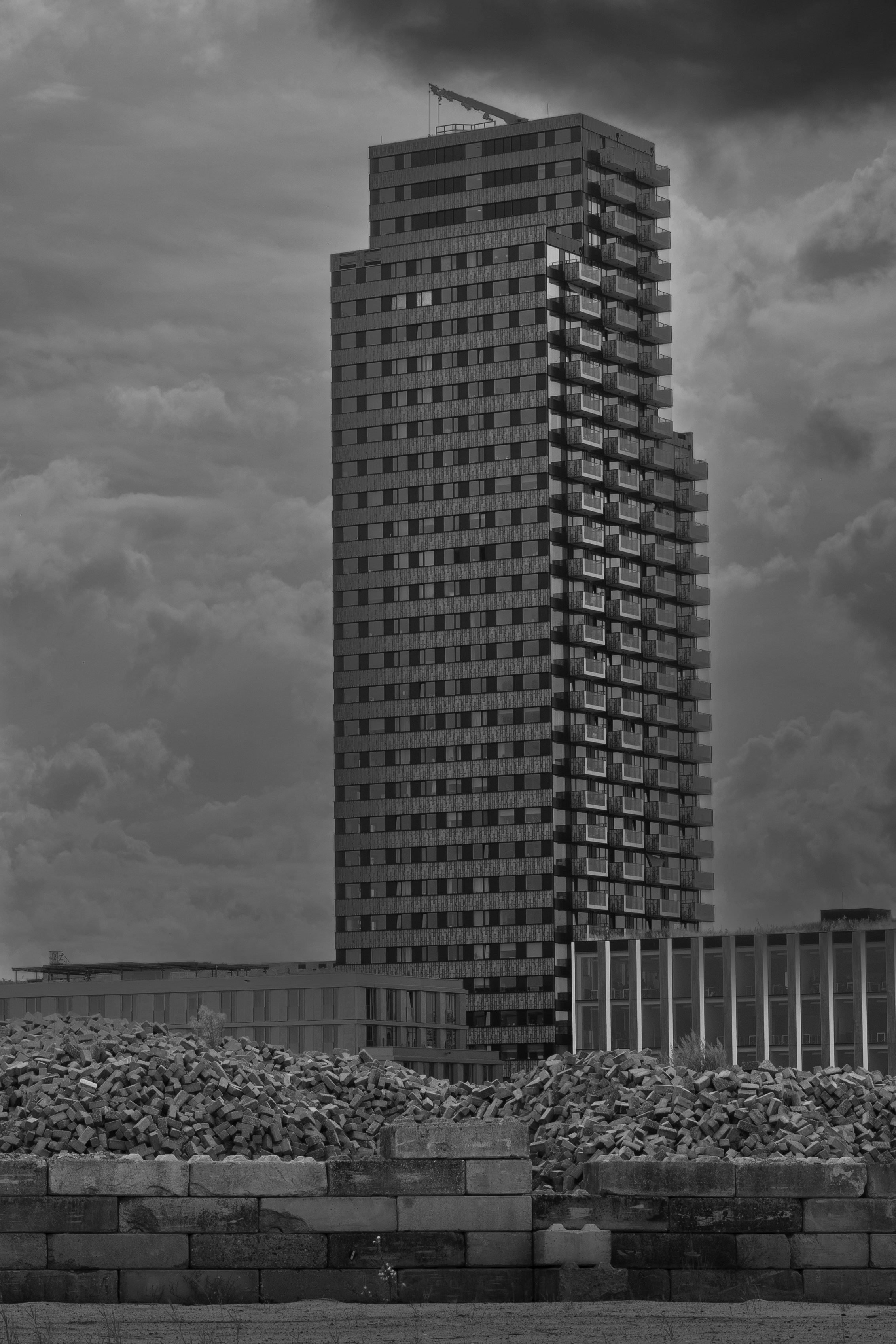 Tall building against a cloudy sky