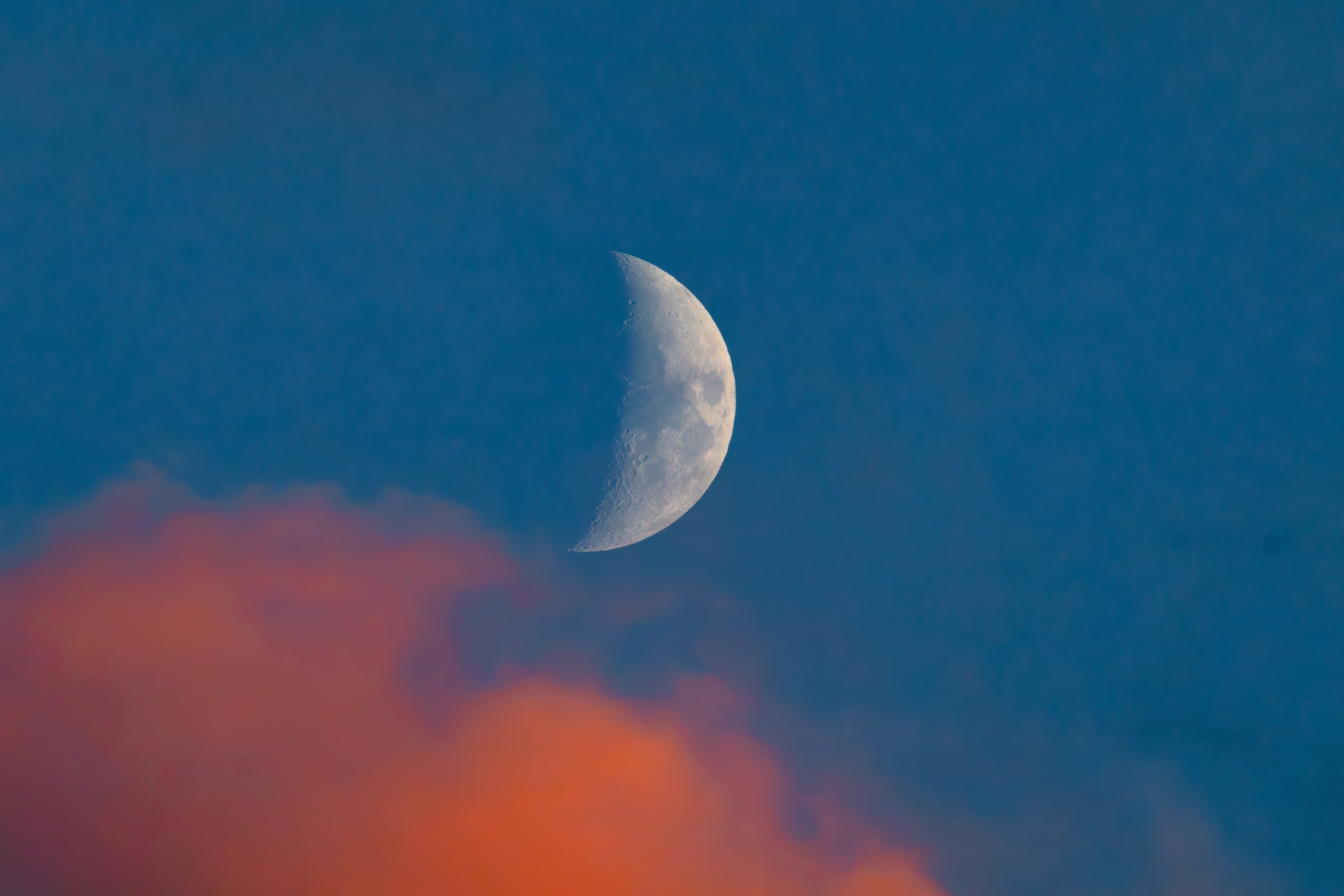moon | Crescent moon partially obscured by clouds