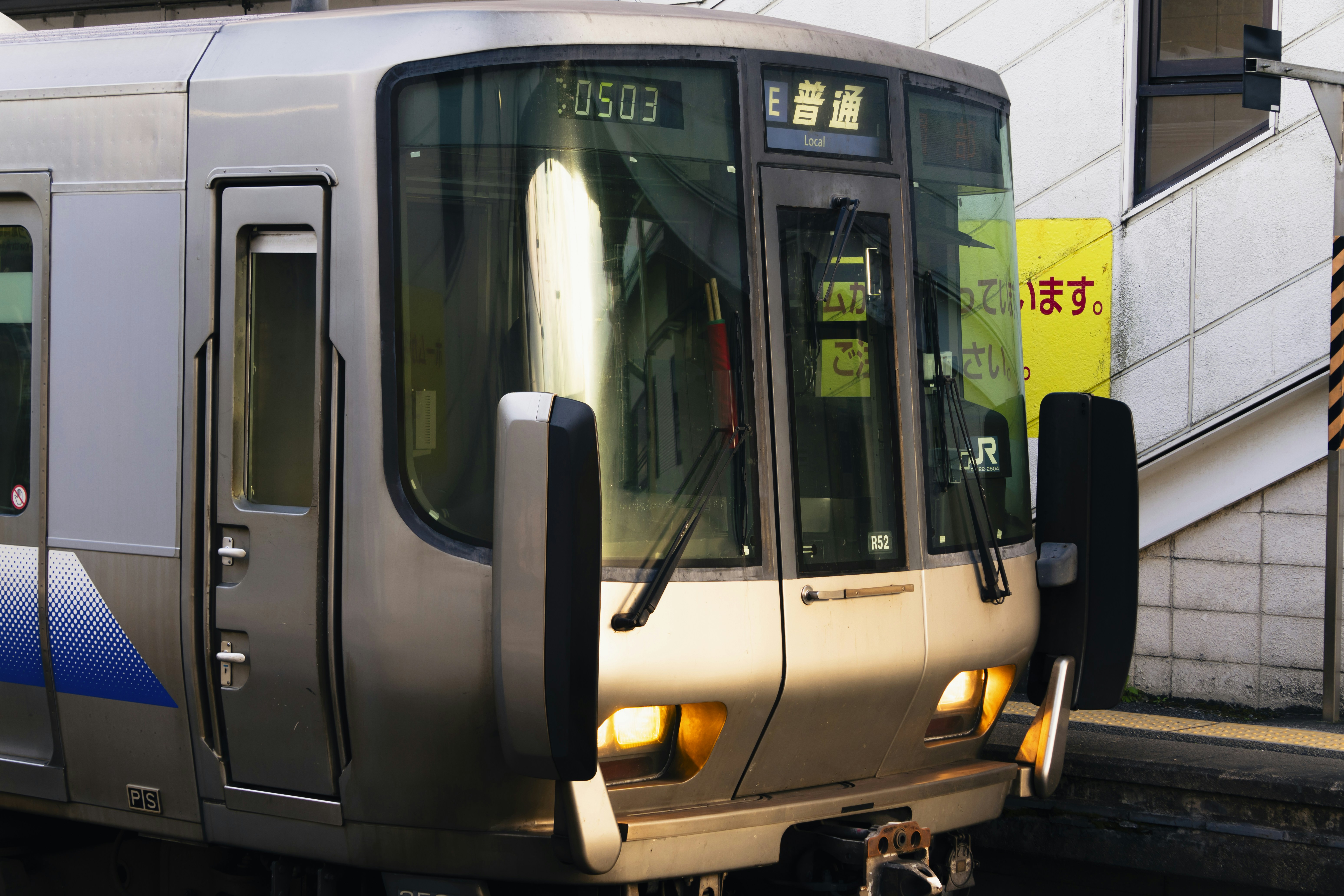 Front view of a modern silver train