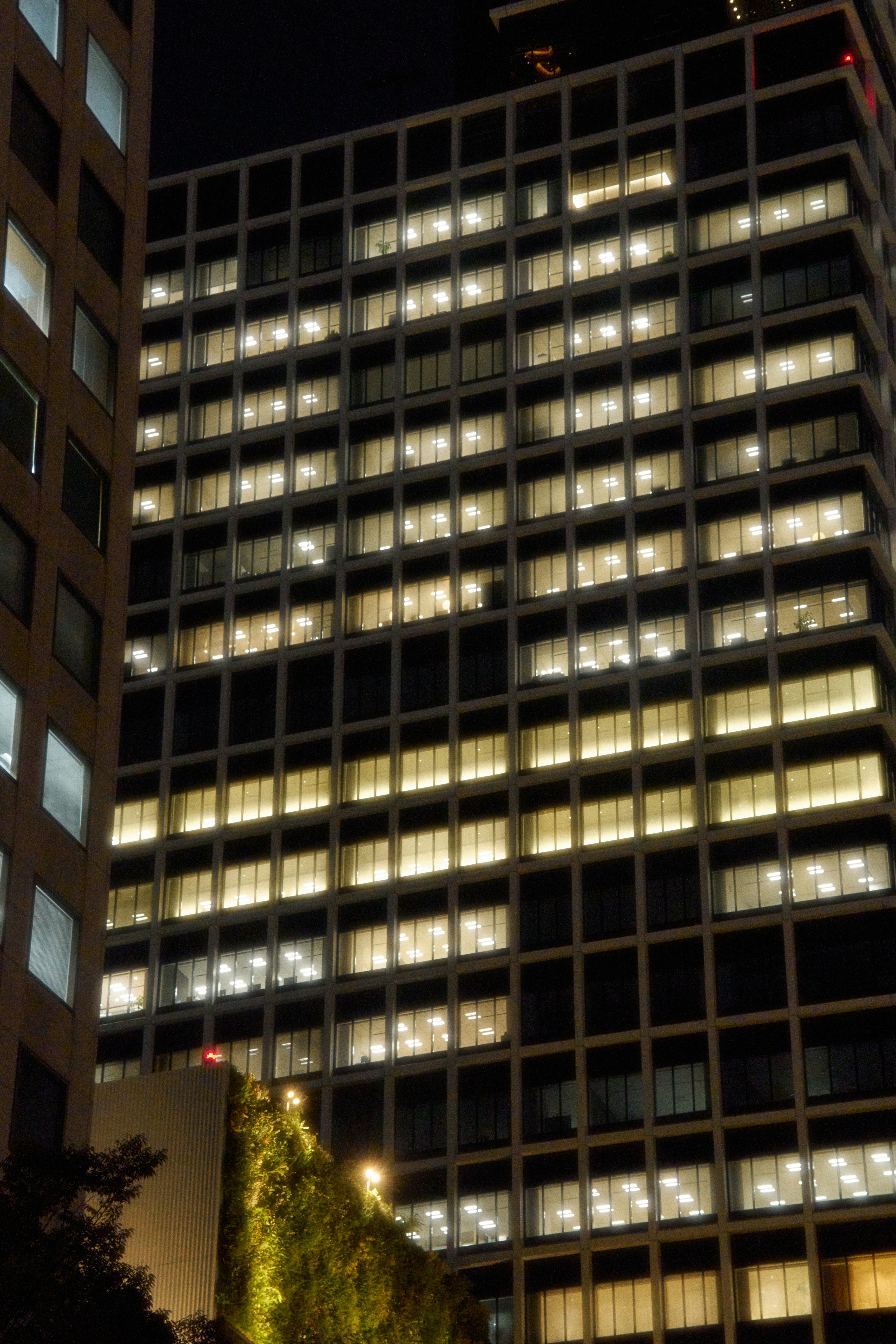 Modern office building with illuminated windows at night photo – Free ...