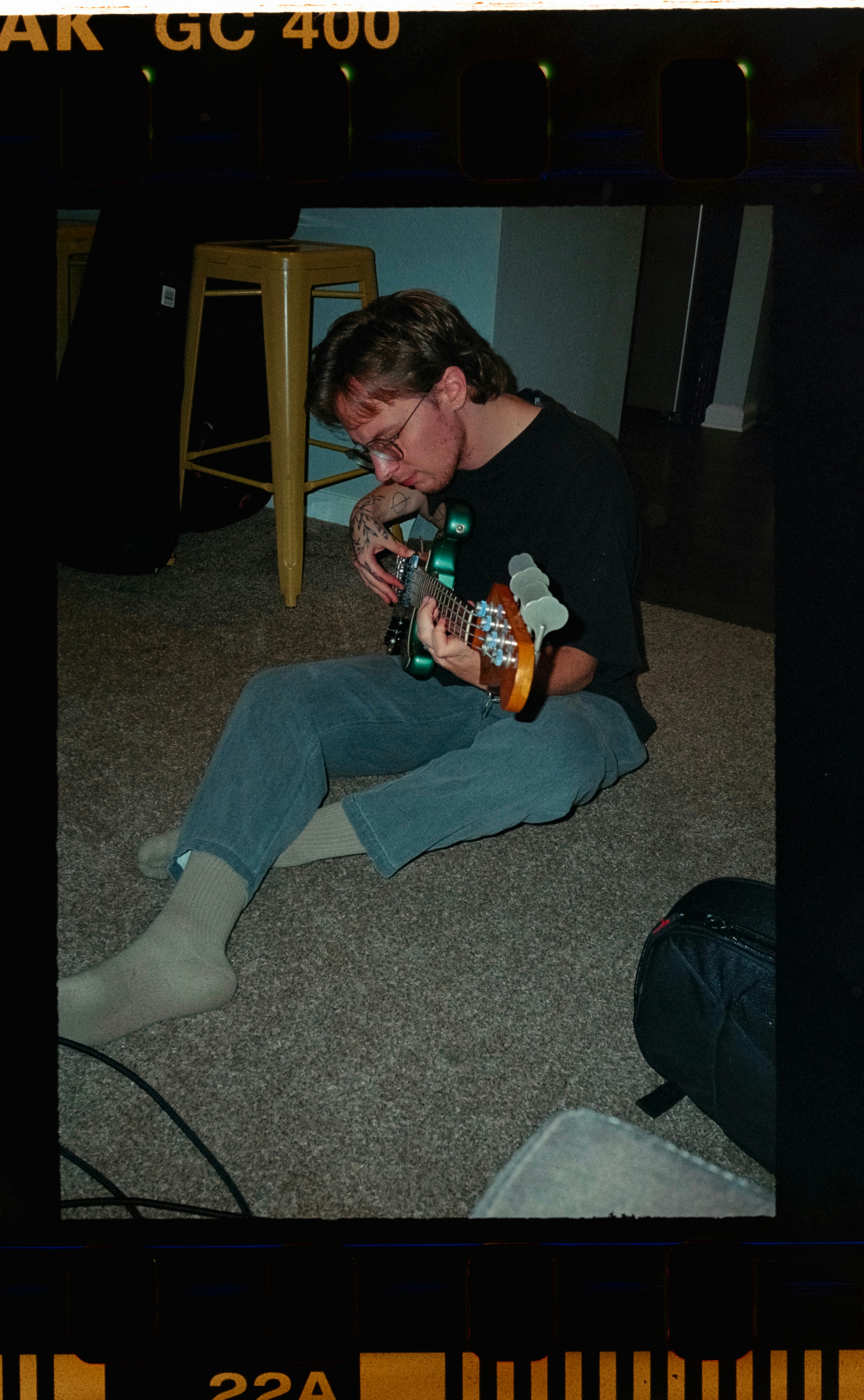 Strumming Solitude: A Moment of Musical Reflection