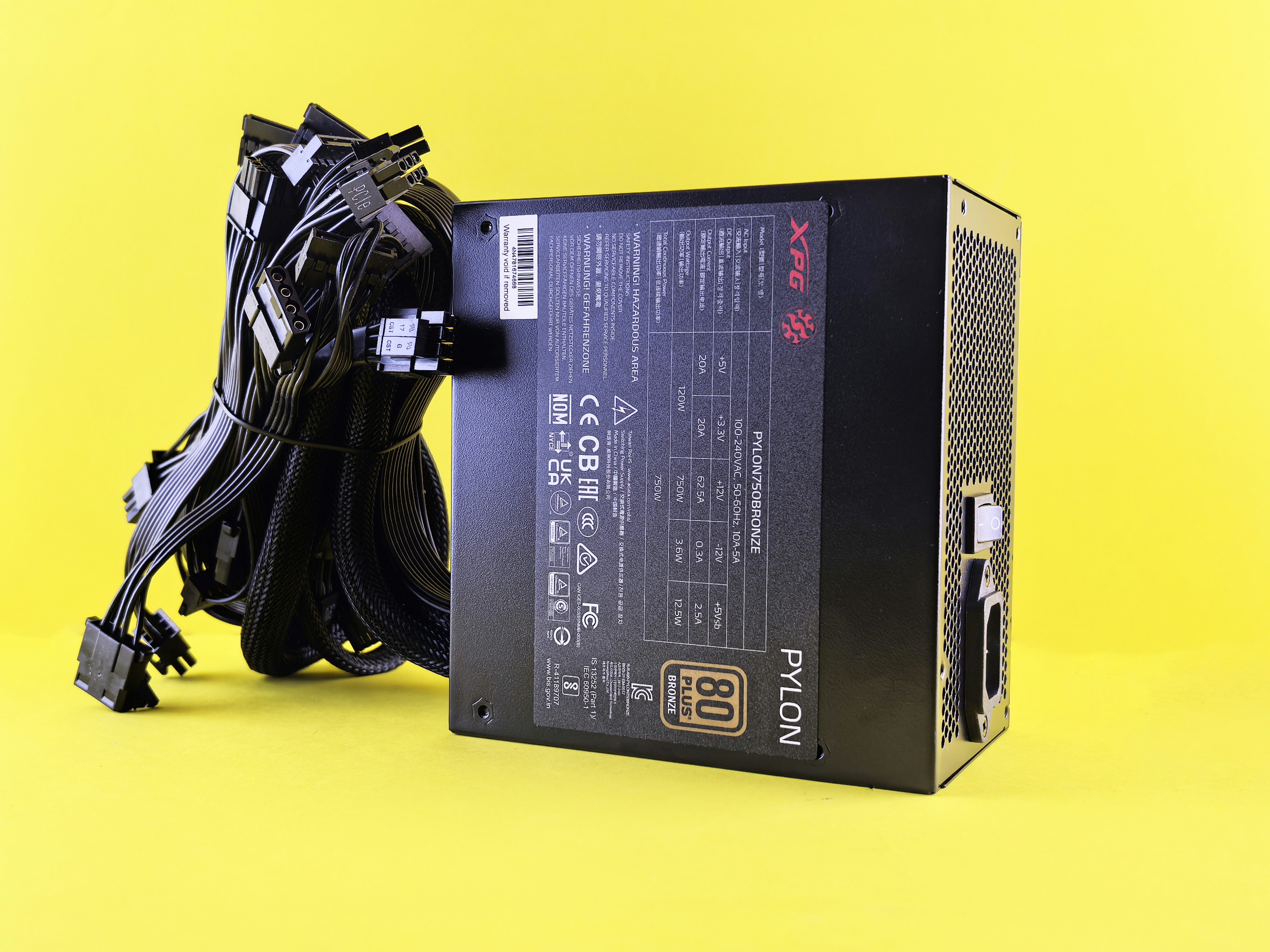 Black computer power supply unit with cables