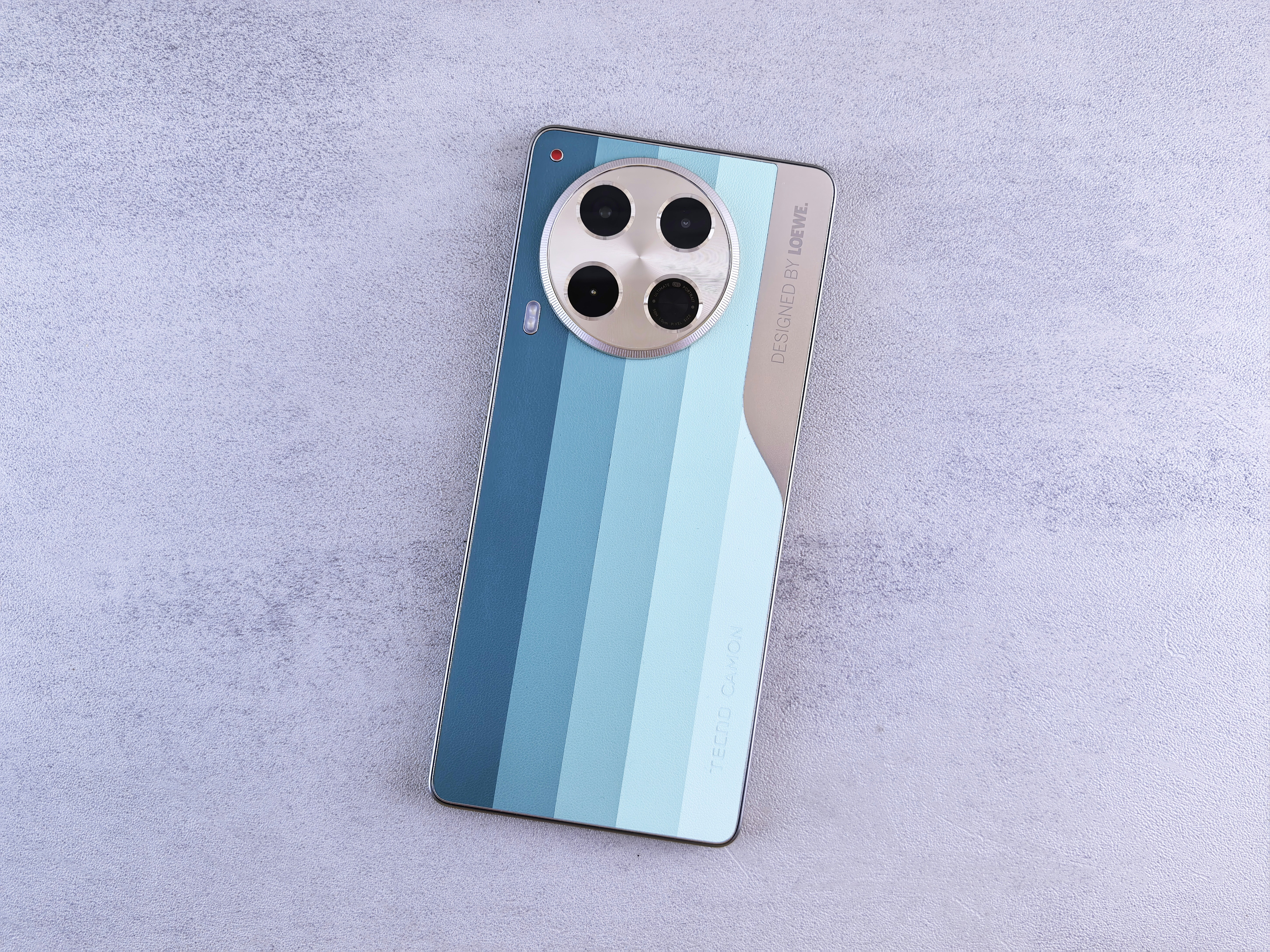 Smartphone with colorful striped back and circular camera array