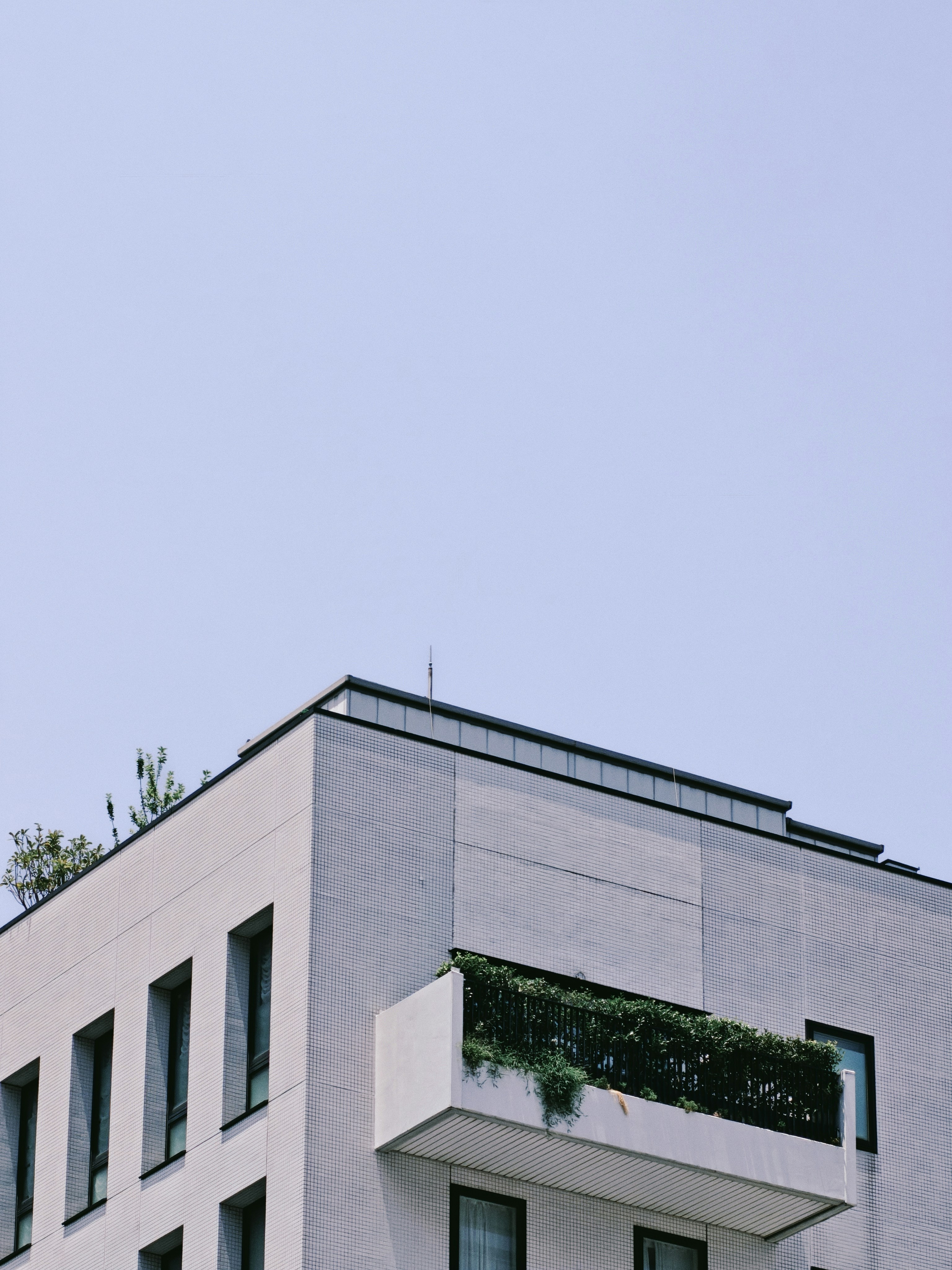 Modern building with a balcony garden
