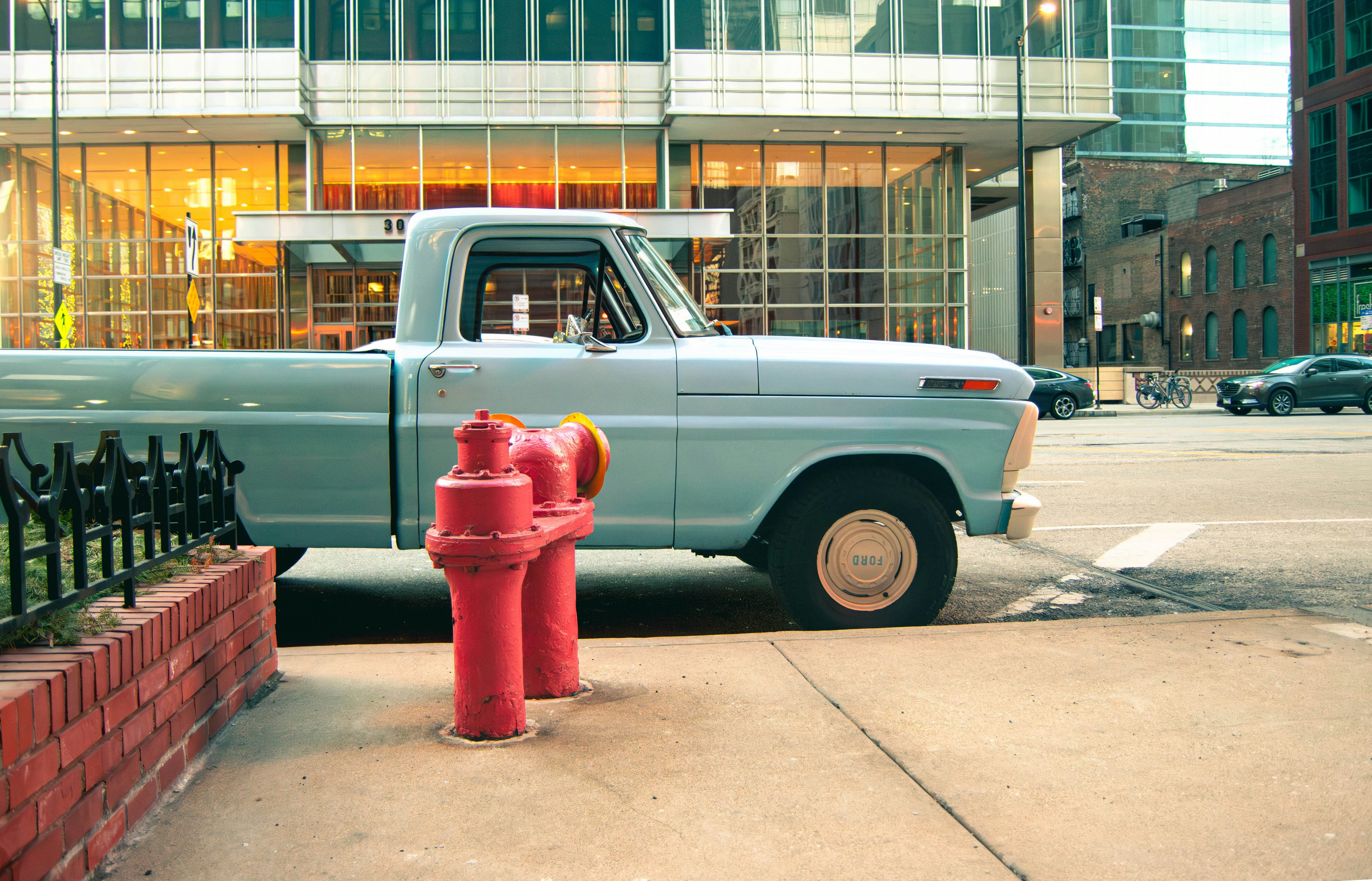 Urban Retro: A Classic Truck's Charm Amidst Modernity