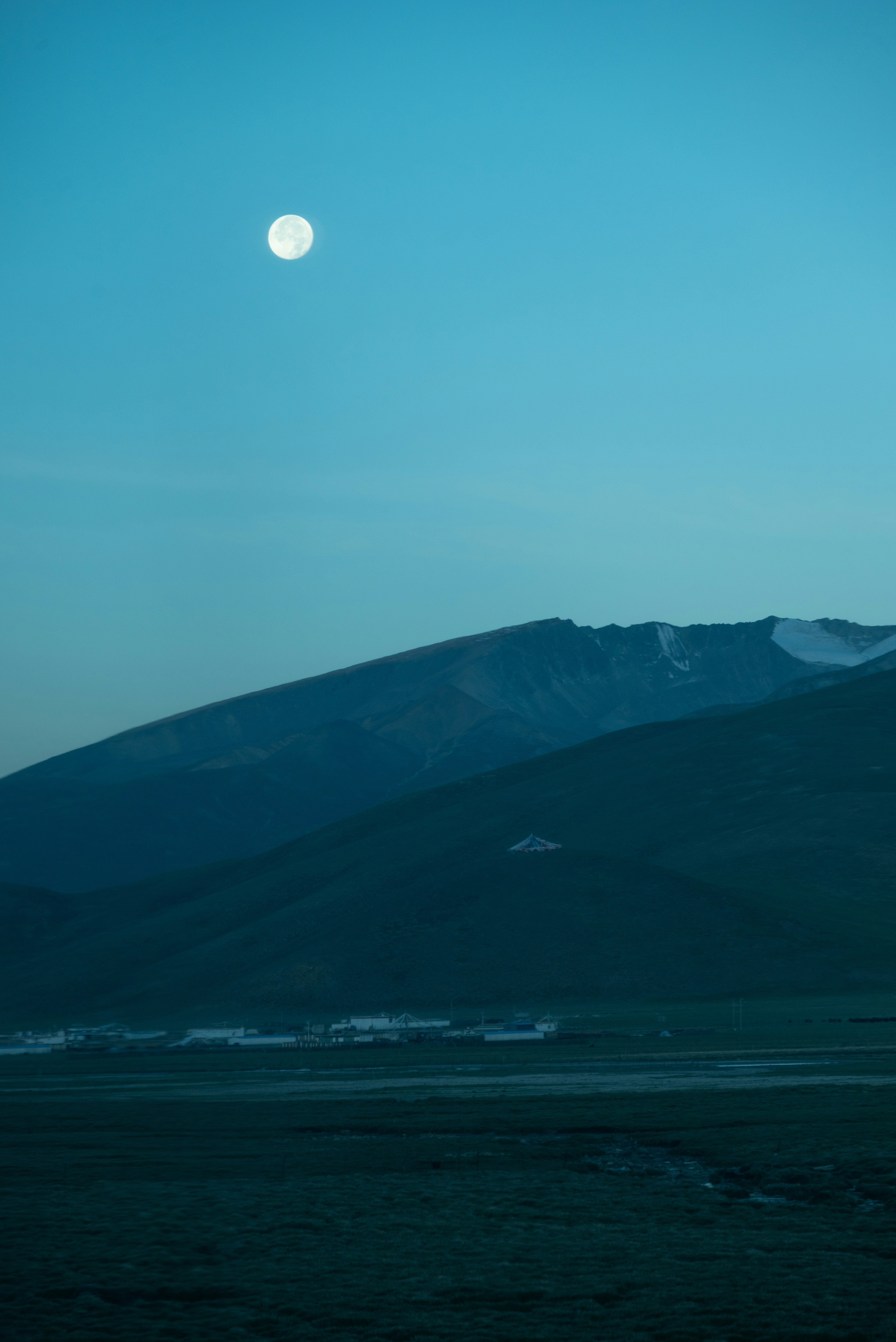 Lunar Serenity Over Majestic Peaks