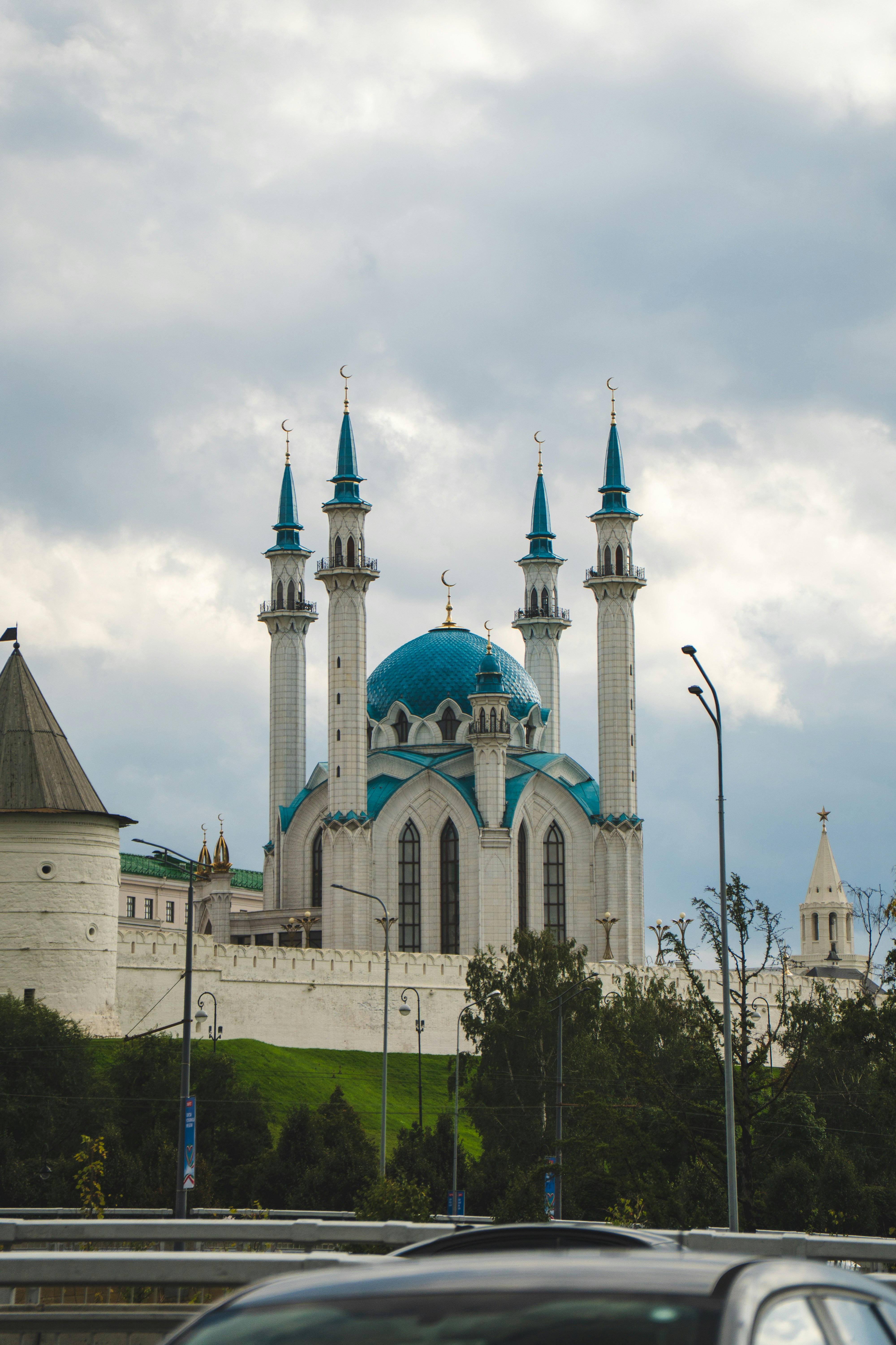 Blue Domes and Turrets: Moscow’s Cathedral Silhouetted by a City Road