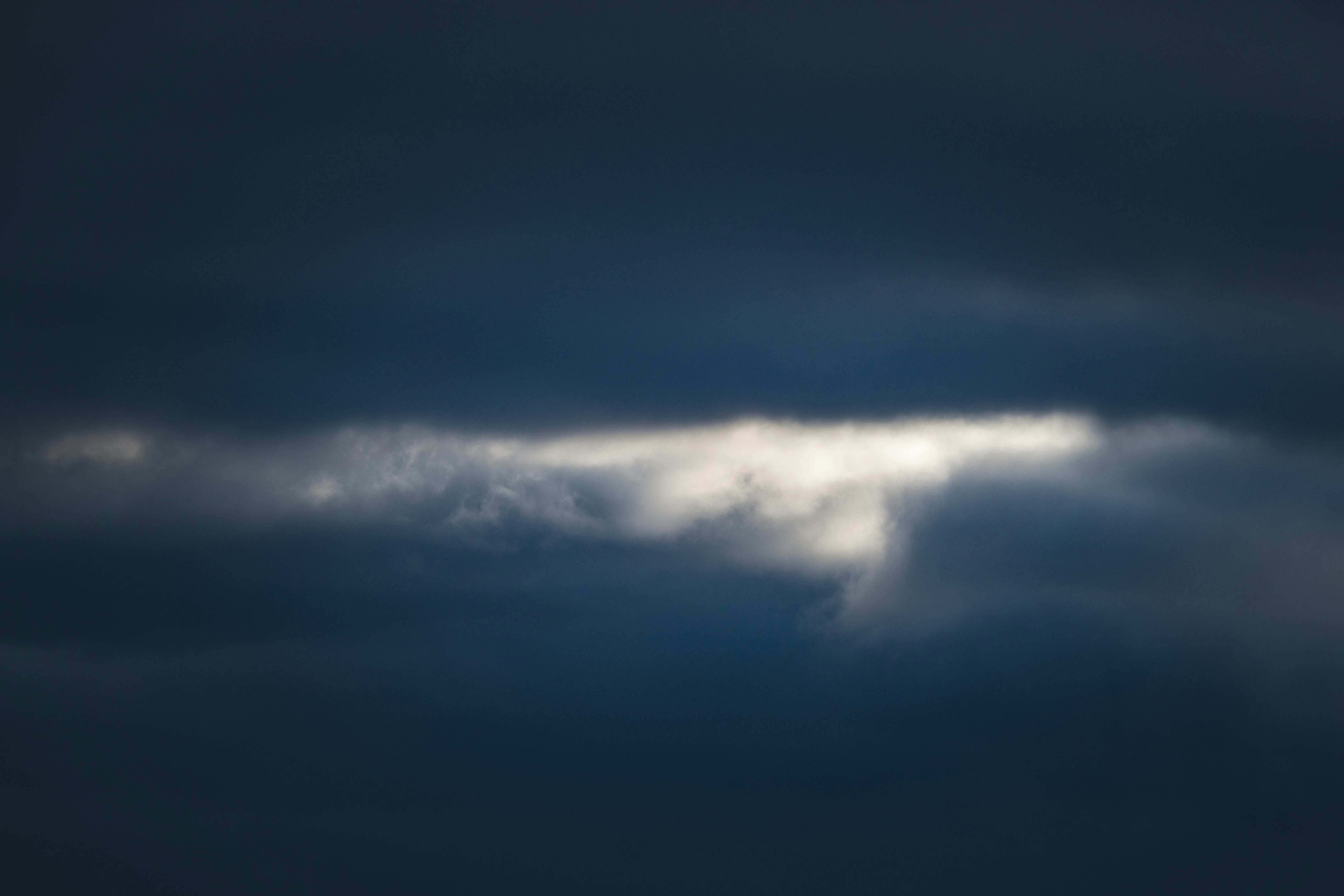 Terceira, Azores | Dark clouds with a bright light breaking through