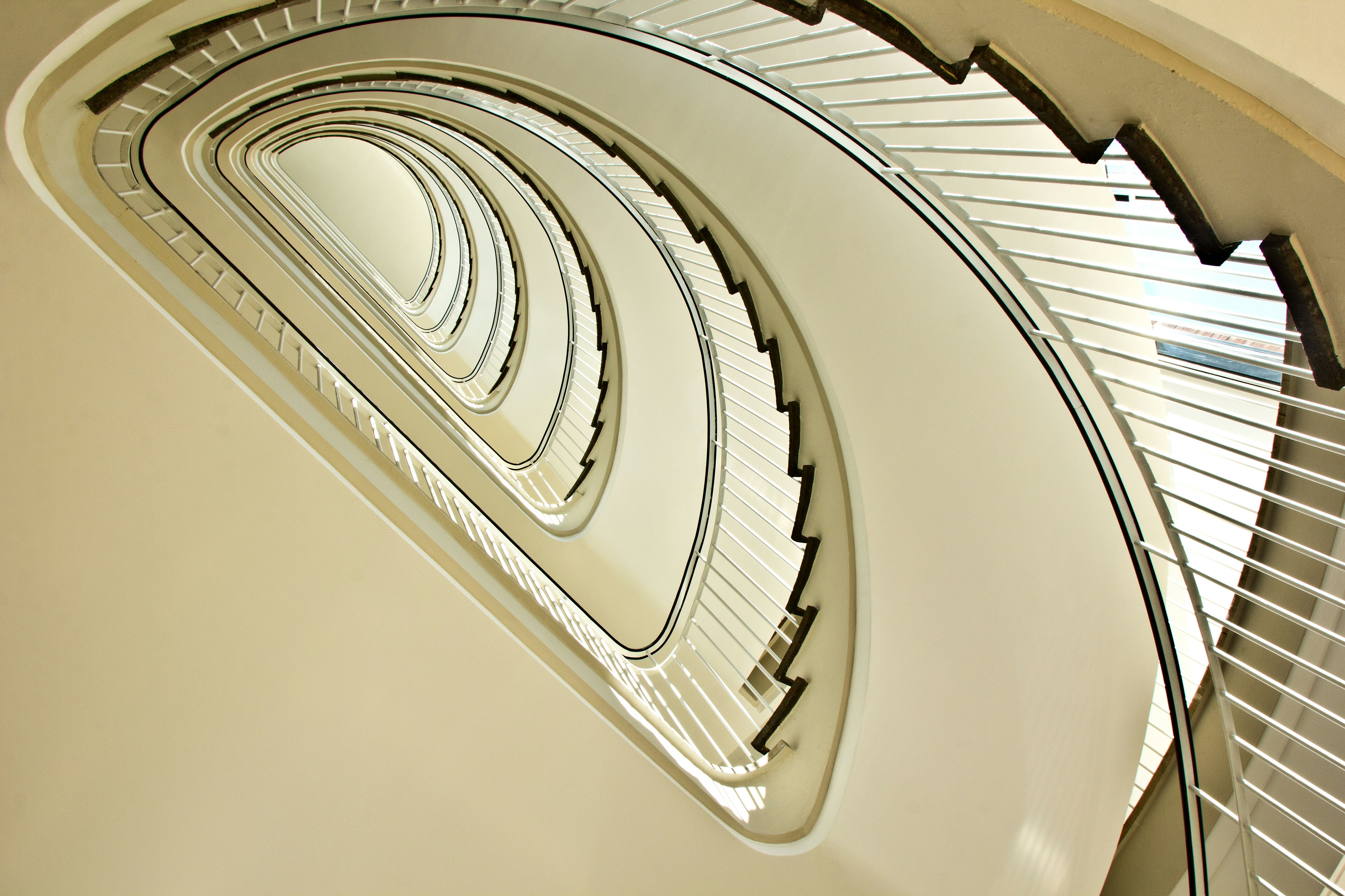 Spiral staircase viewed from below looking up