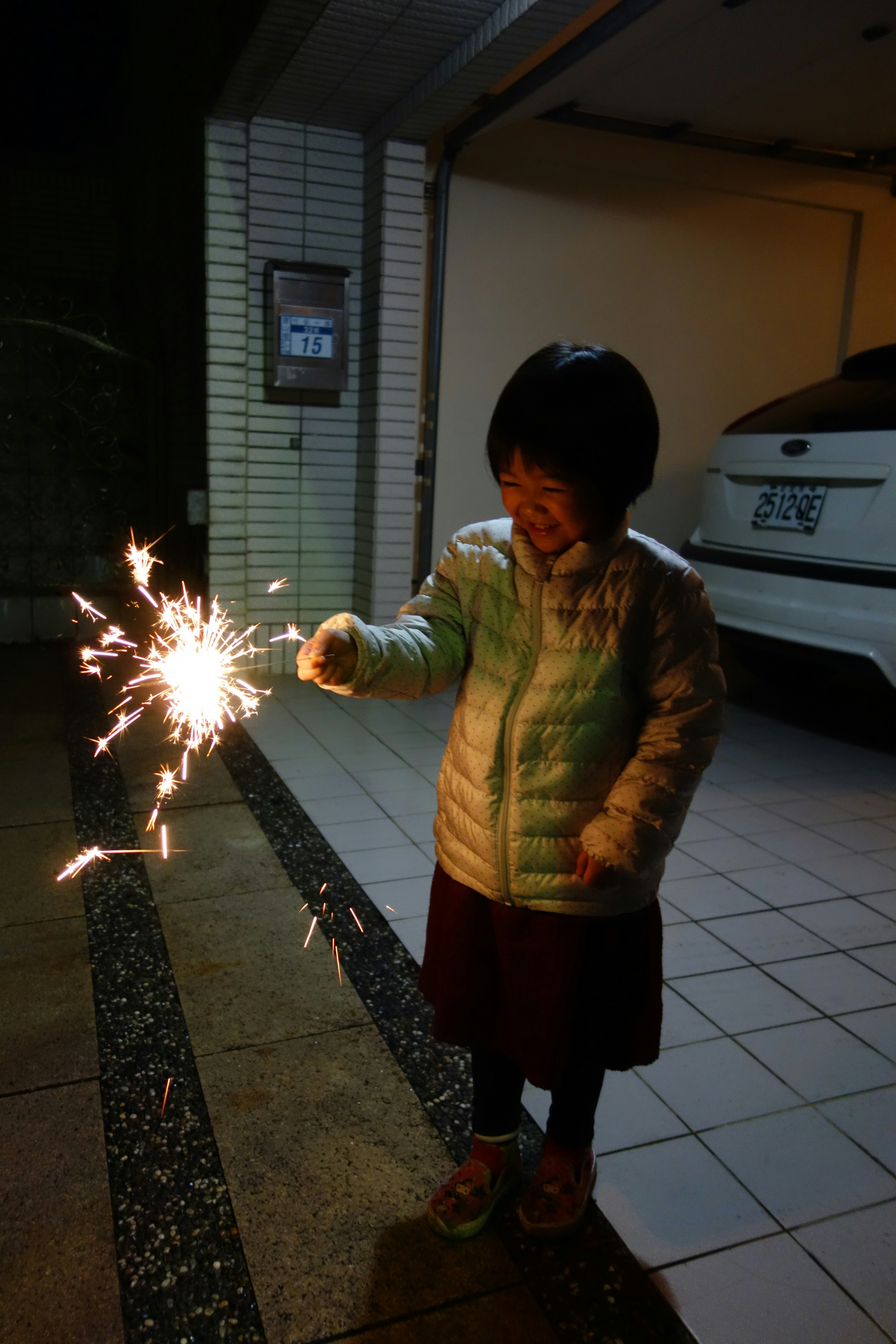 Joyful Sparks: A Child's Nighttime Celebration