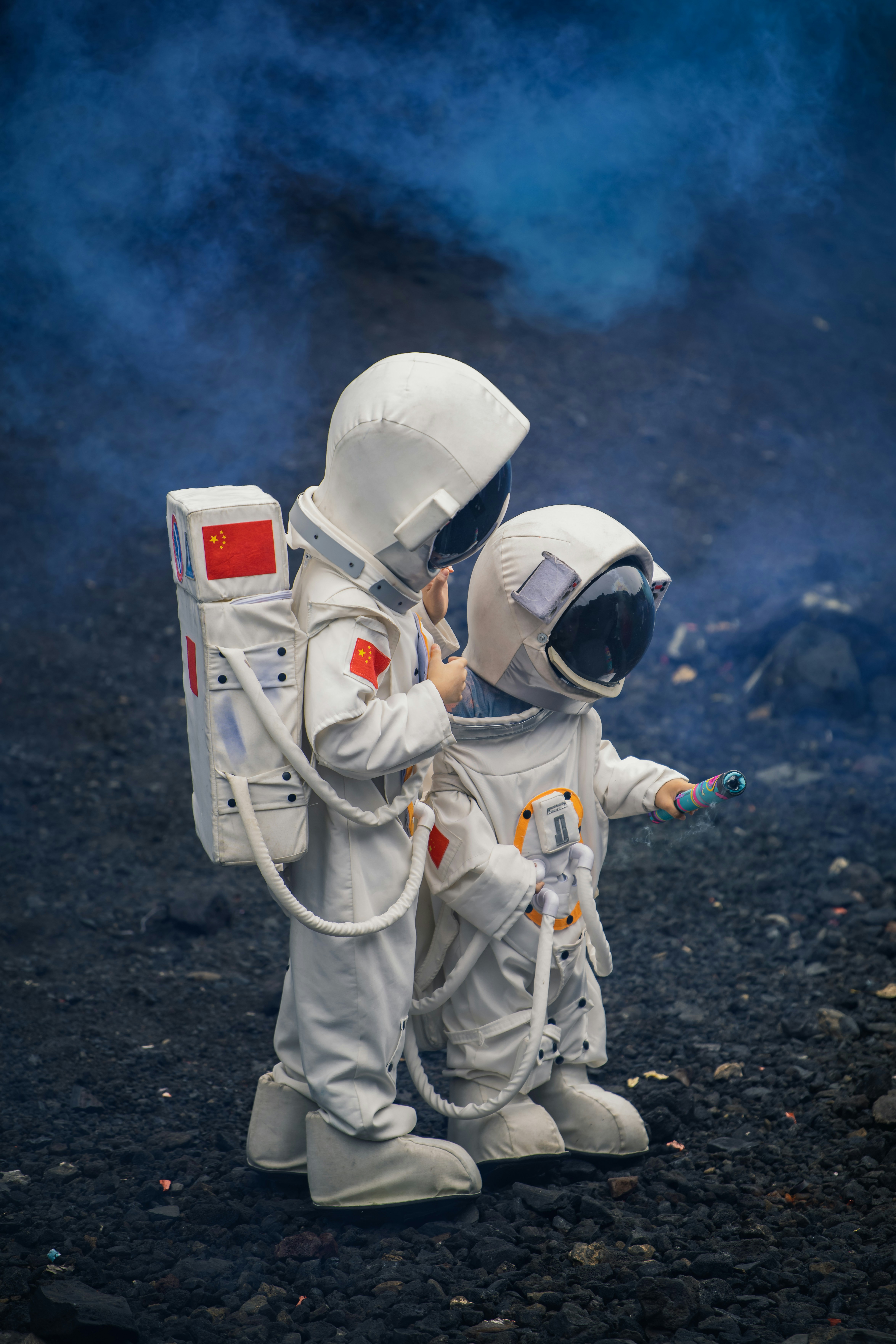 Tiny Astronauts in a Smoke-Kissed Lunar Field
