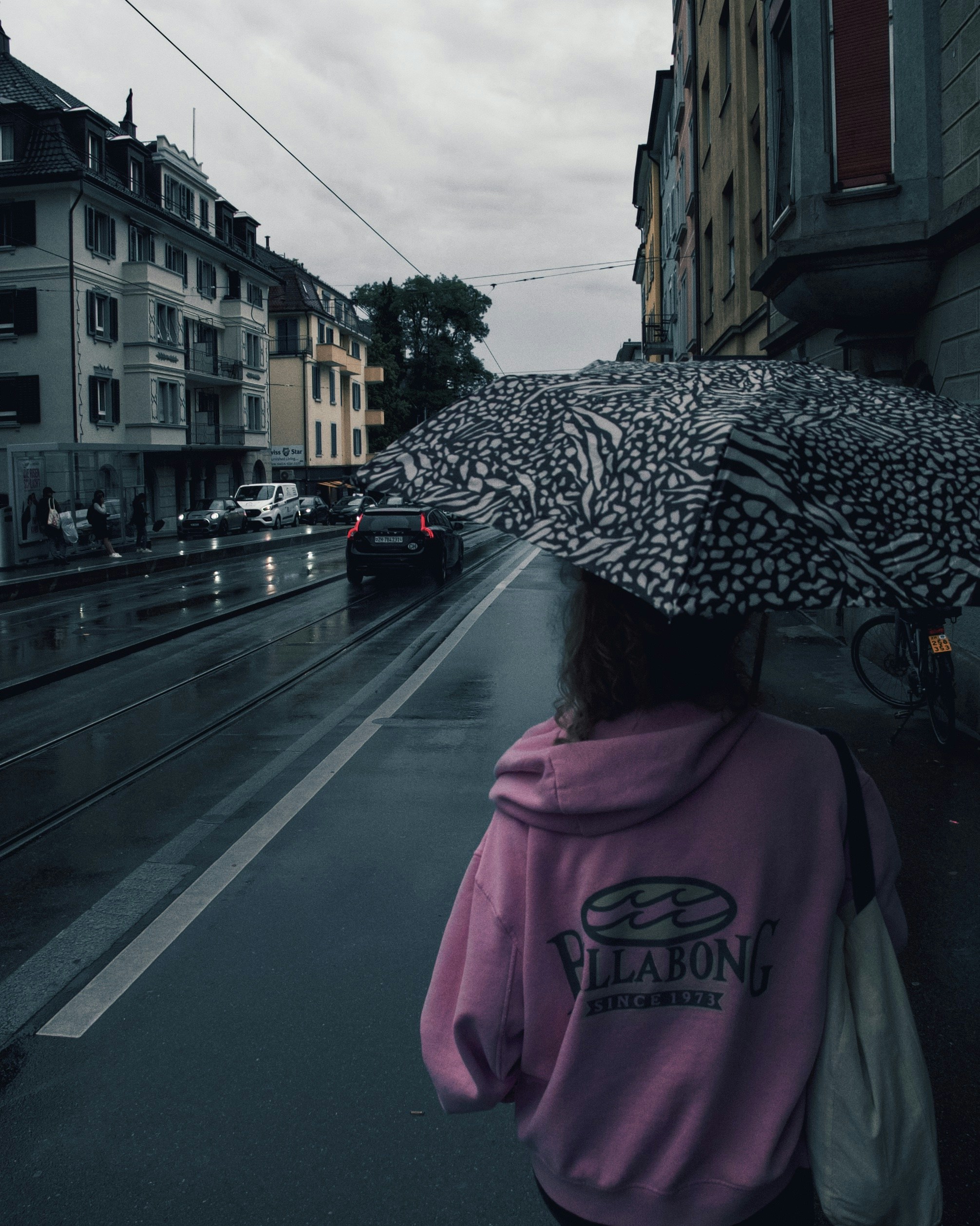 Urban Reflections: A Walk in the Rain